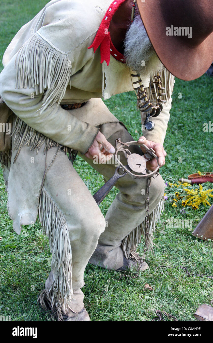 A trapper setting the traps for hunting Stock Photo - Alamy