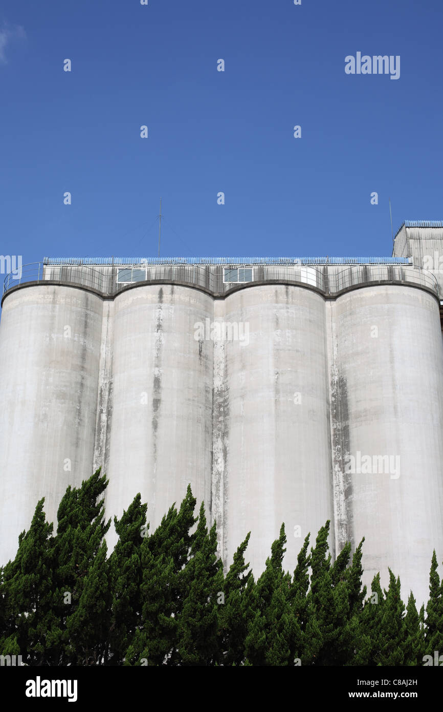 Photograph of storage silo and blue sky Stock Photo - Alamy