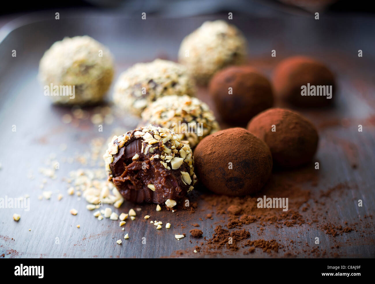 Different flavored chocolate truffles Stock Photo - Alamy