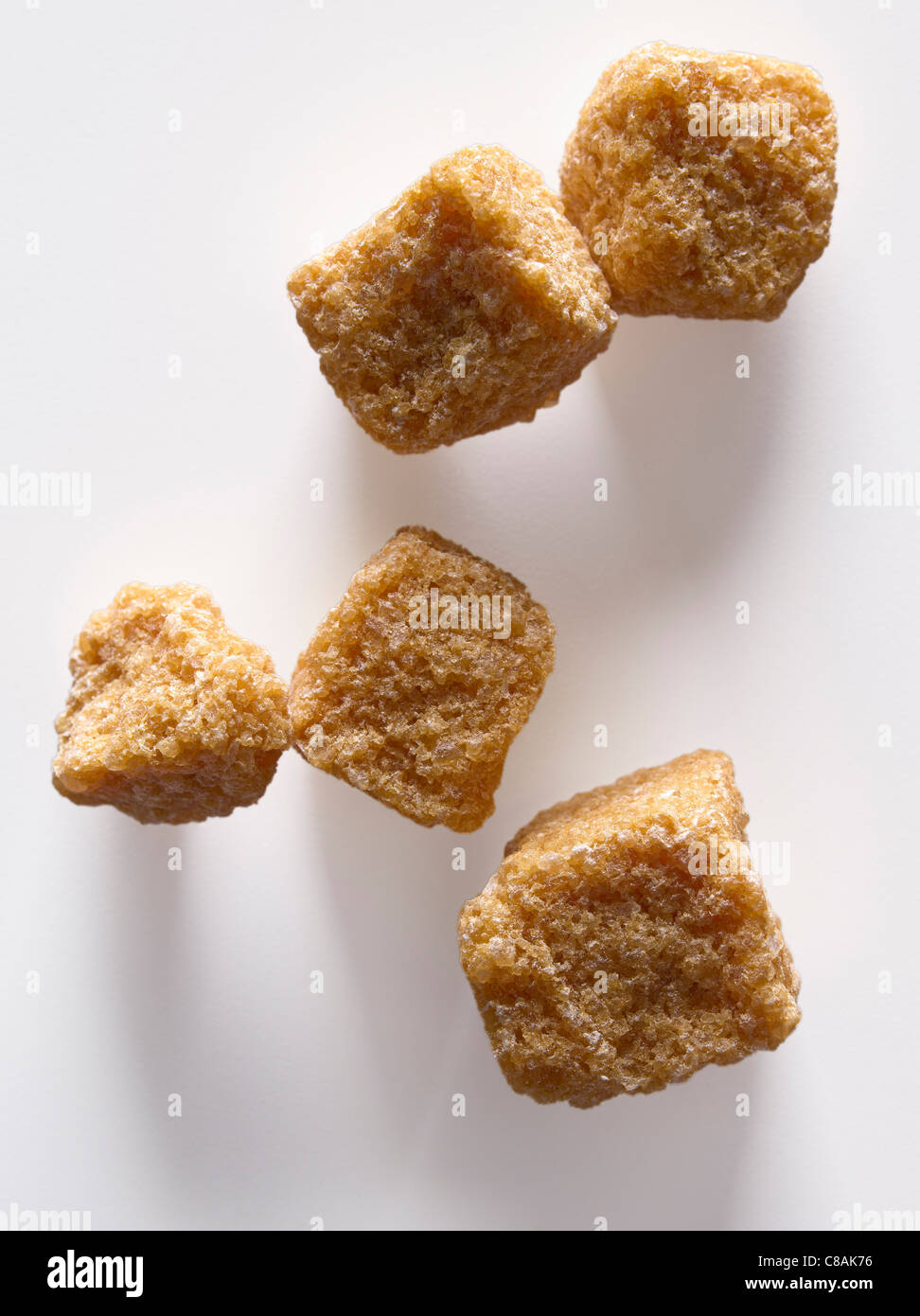 Brown sugar lumps Stock Photo - Alamy