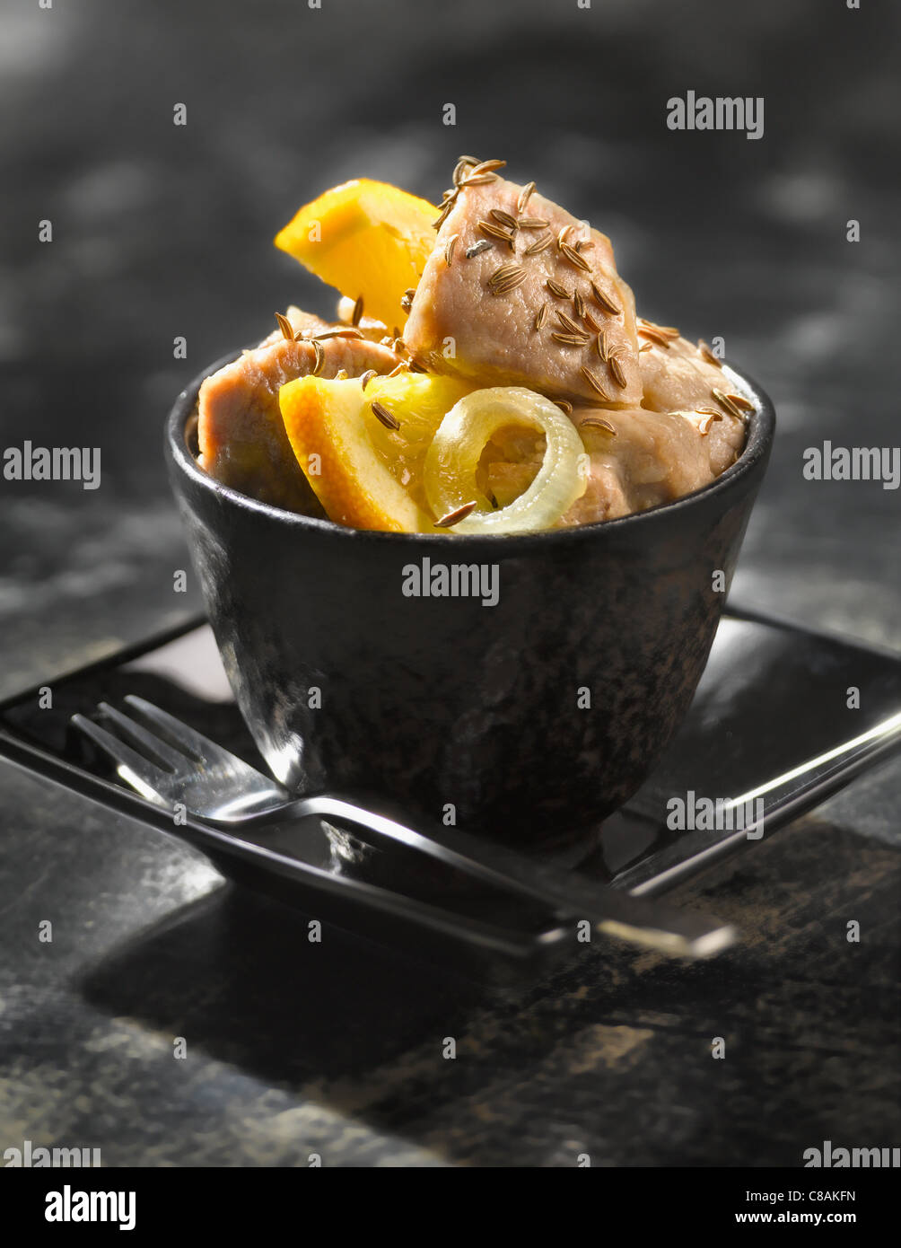 Pork with orange and cumin Stock Photo - Alamy