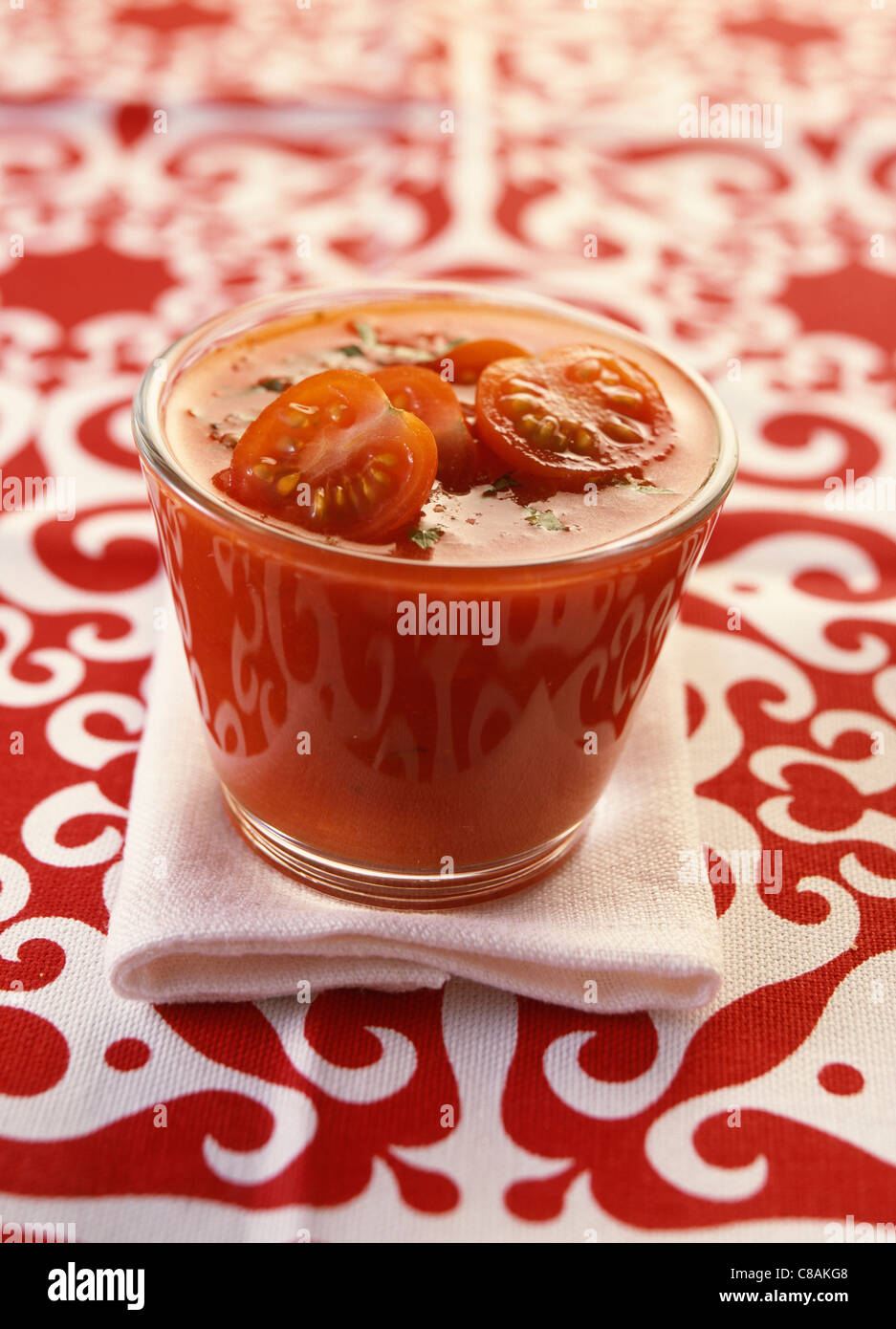 Cherry tomato and basil coulis Stock Photo - Alamy