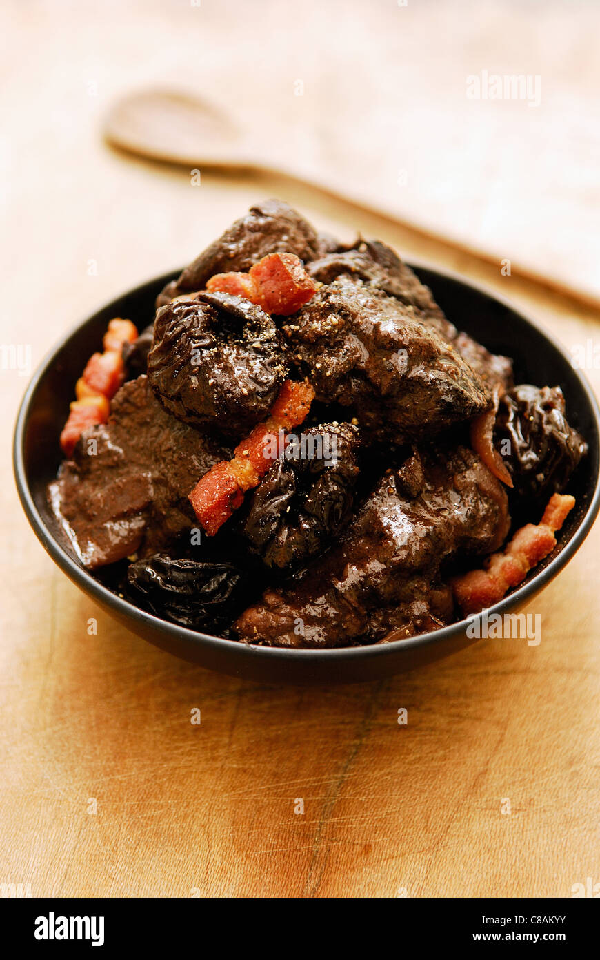 Daube cooked with red wine,prunes and bacon Stock Photo - Alamy