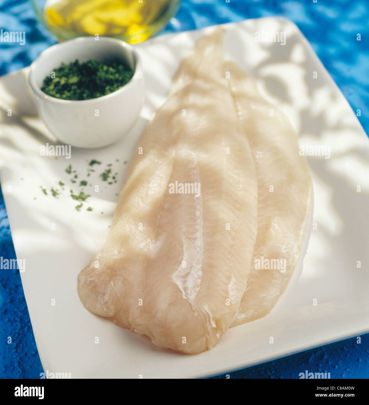 Raw hake fillets Stock Photo - Alamy