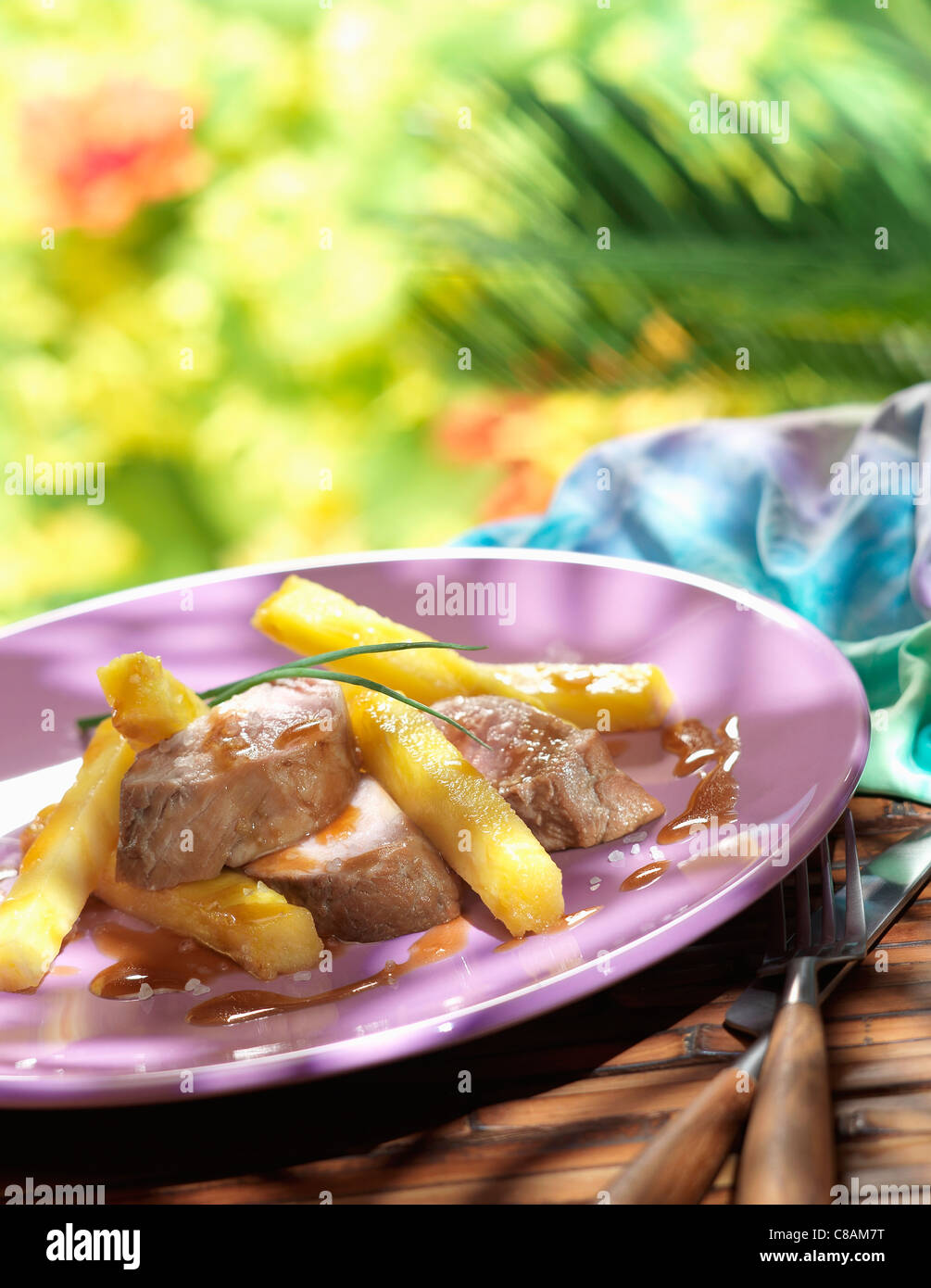 Pork filet mignon with pineapple chips Stock Photo - Alamy