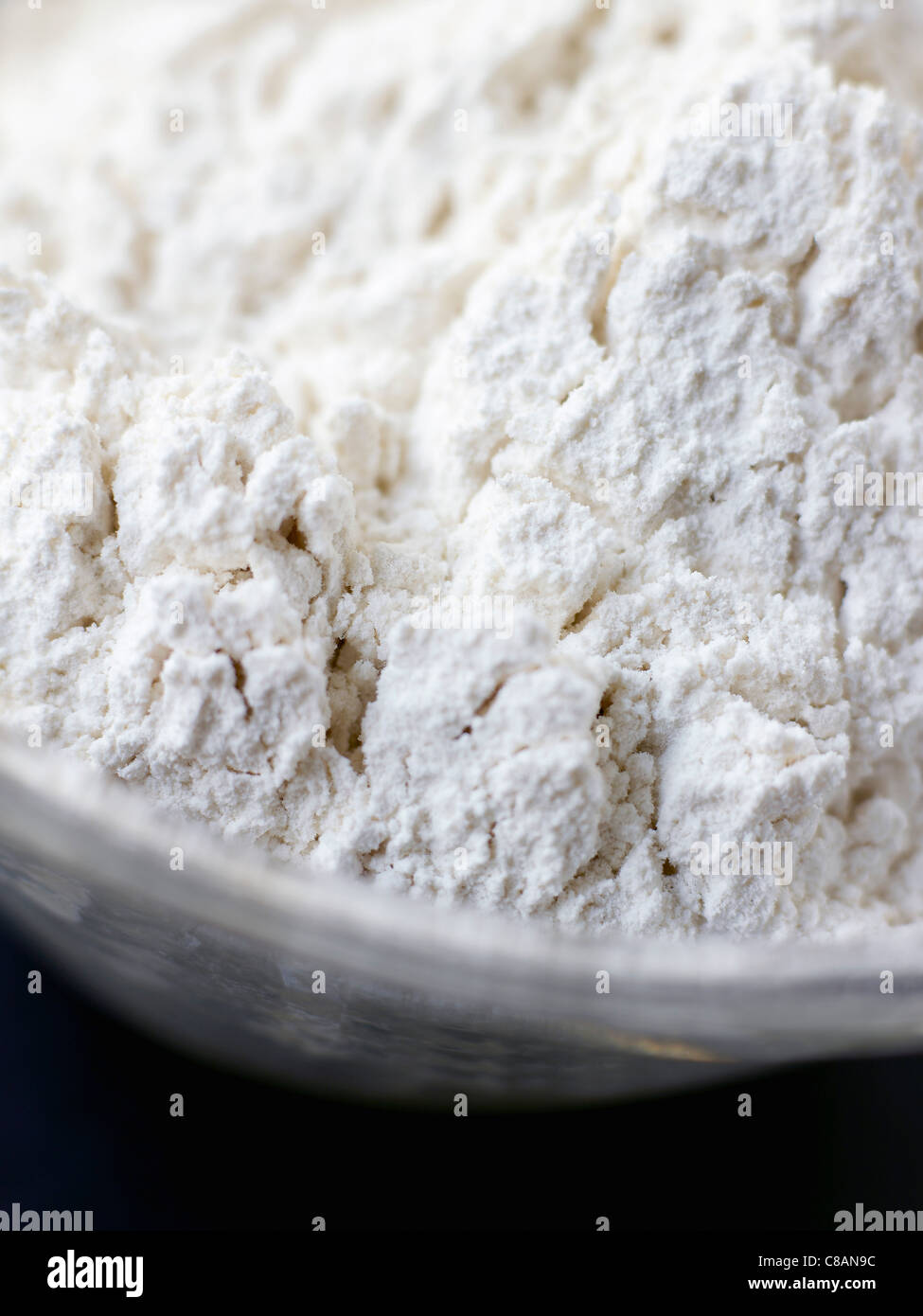 Bowl of flour Stock Photo - Alamy