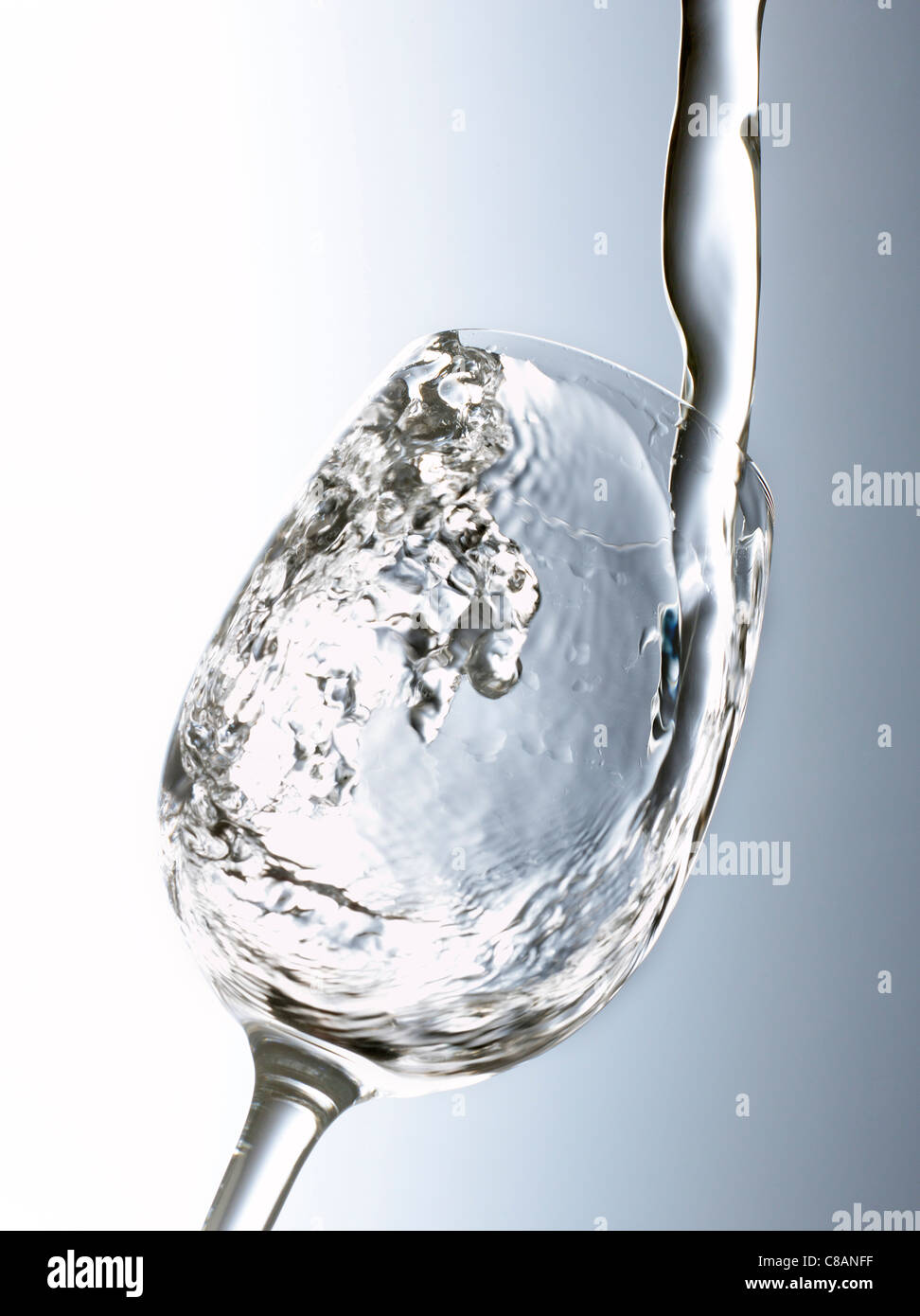 Filling a glass with tap water Stock Photo - Alamy