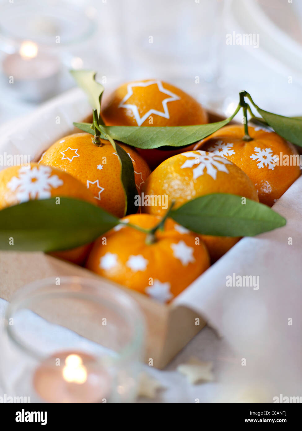 Box of decorated clementines Stock Photo - Alamy