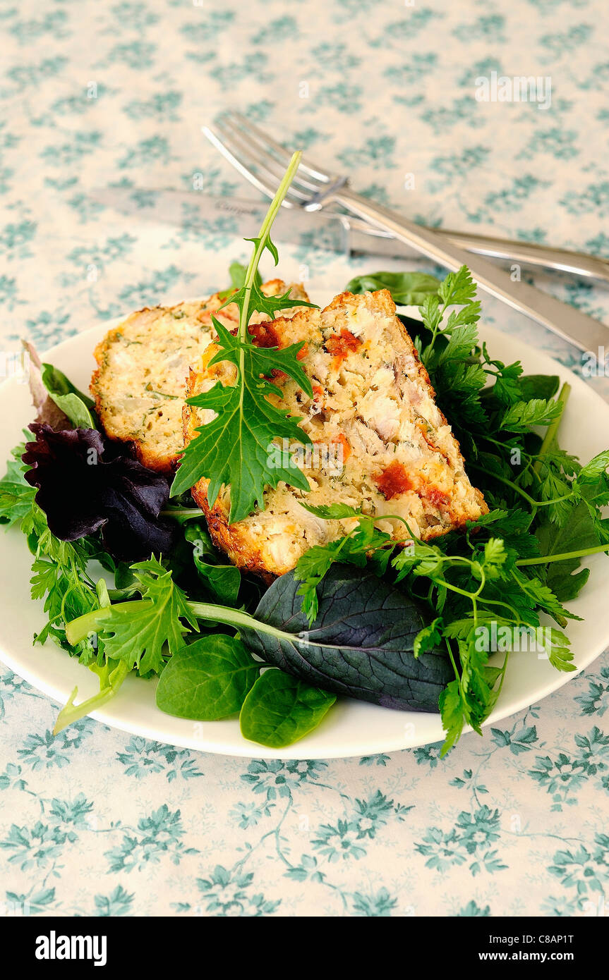 Slice of sea bream and fennel savoury loaf cake Stock Photo - Alamy