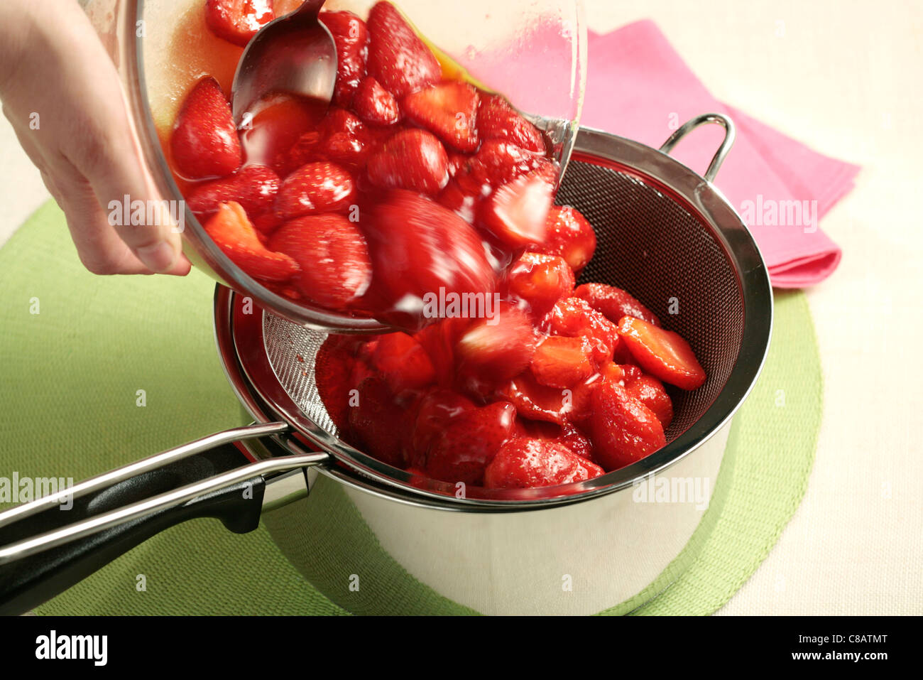 Straining food hi-res stock photography and images - Alamy