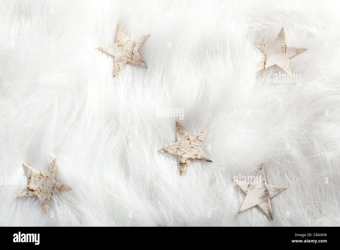 christmas white stars on fur snow background Stock Photo - Alamy