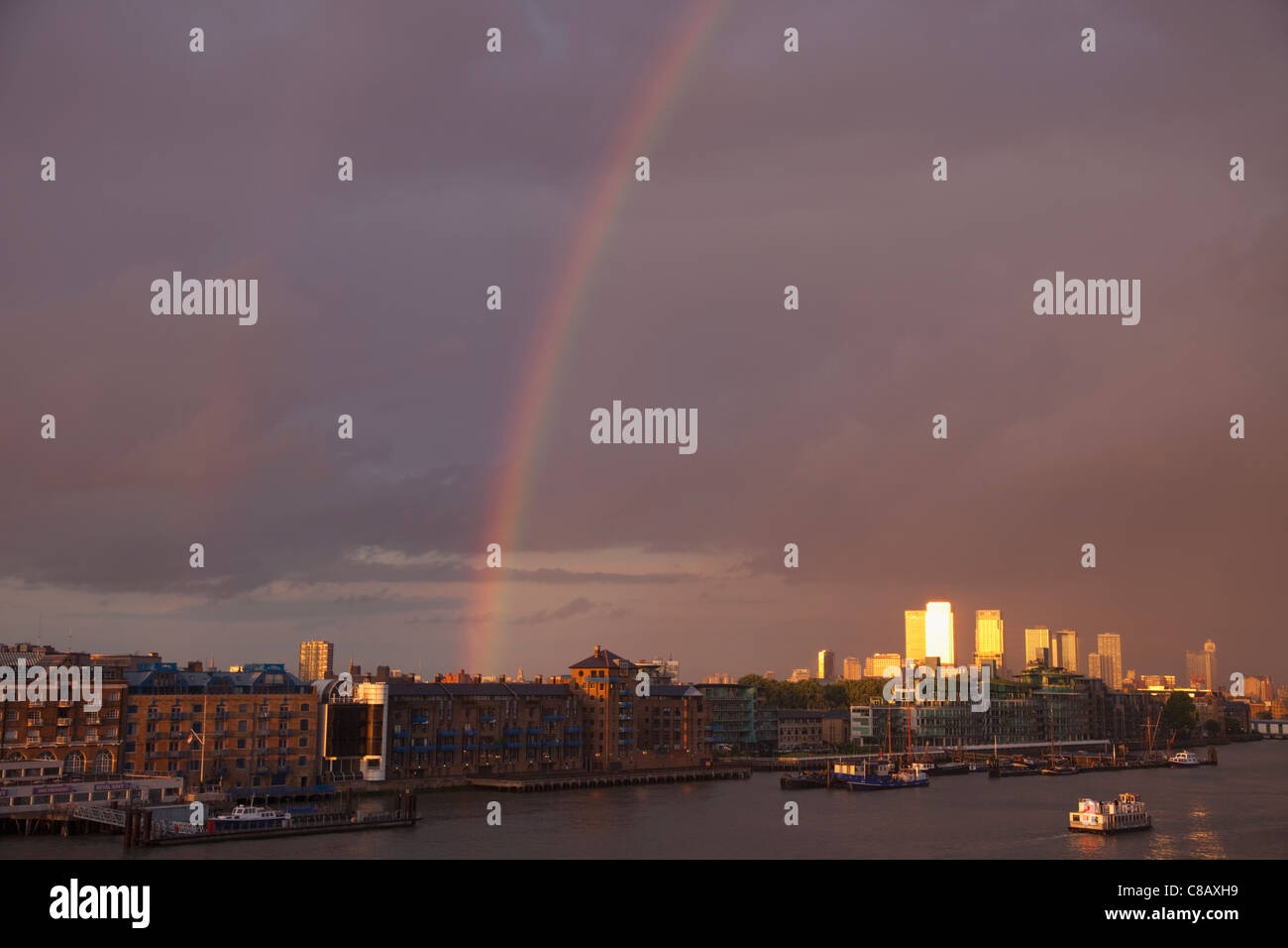 England, London, Rainbow over Docklands Skyline and River Thames Stock ...