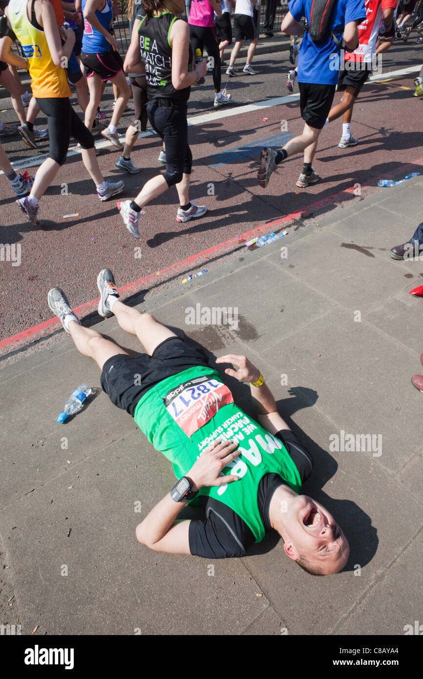 England, London, London Marathon, Fallen Runner Suffering from Cramp ...