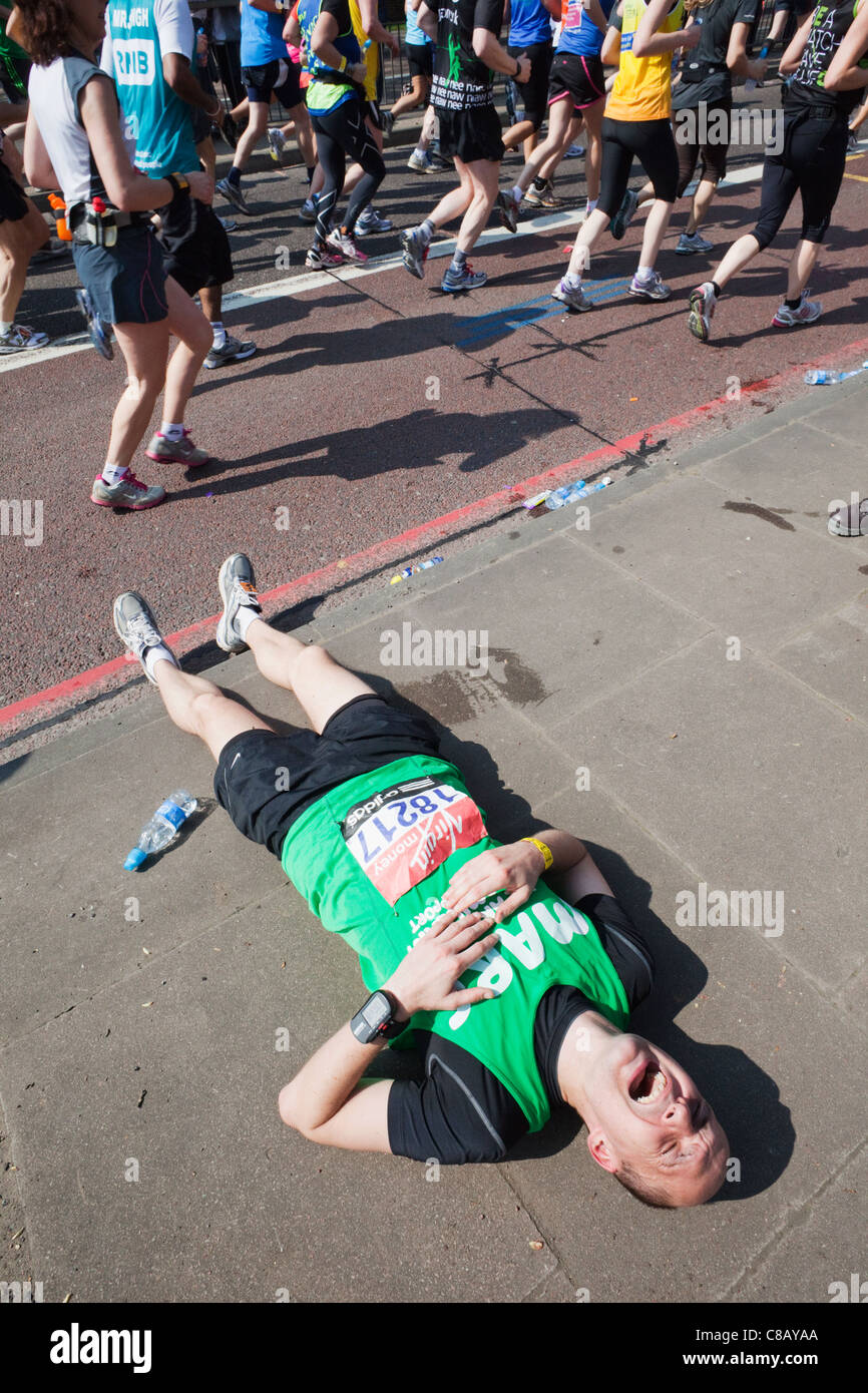 Injured runner athlete race hi-res stock photography and images - Alamy