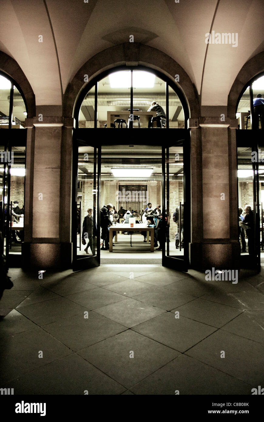 Covent Garden Apple Store at night portrait Stock Photo - Alamy