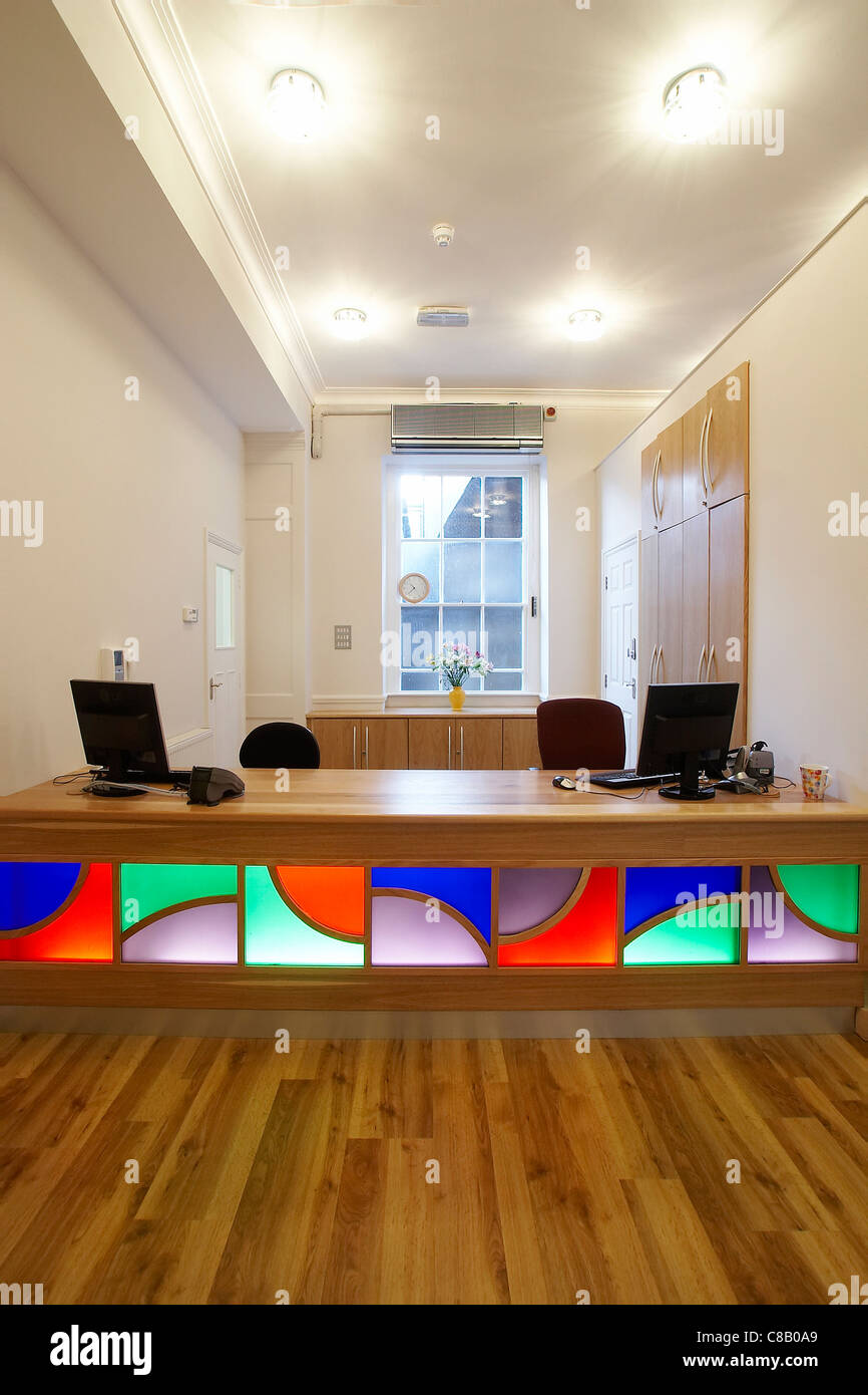 Empty reception desk at a dental surgery Stock Photo - Alamy