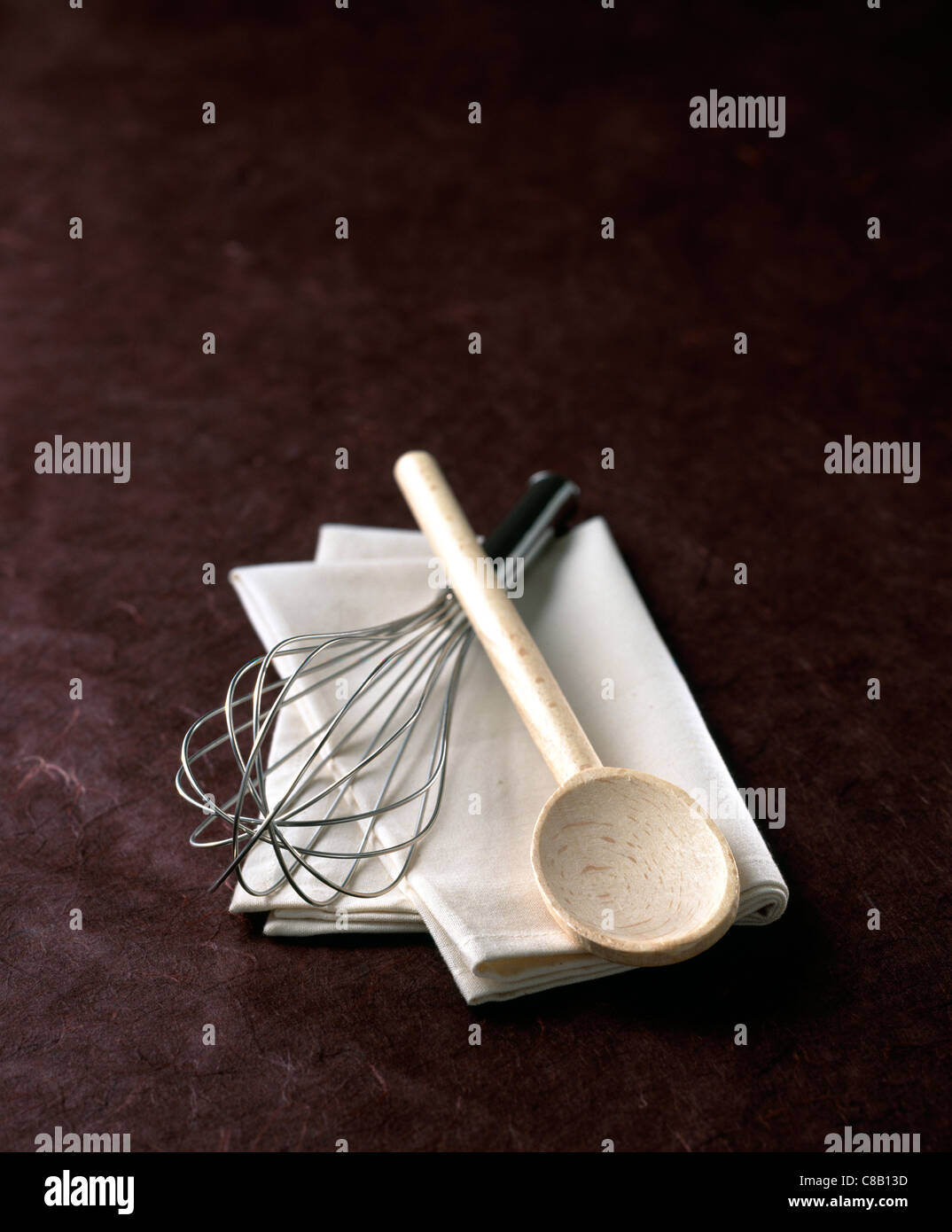 Whisk and wooden spoon Stock Photo - Alamy