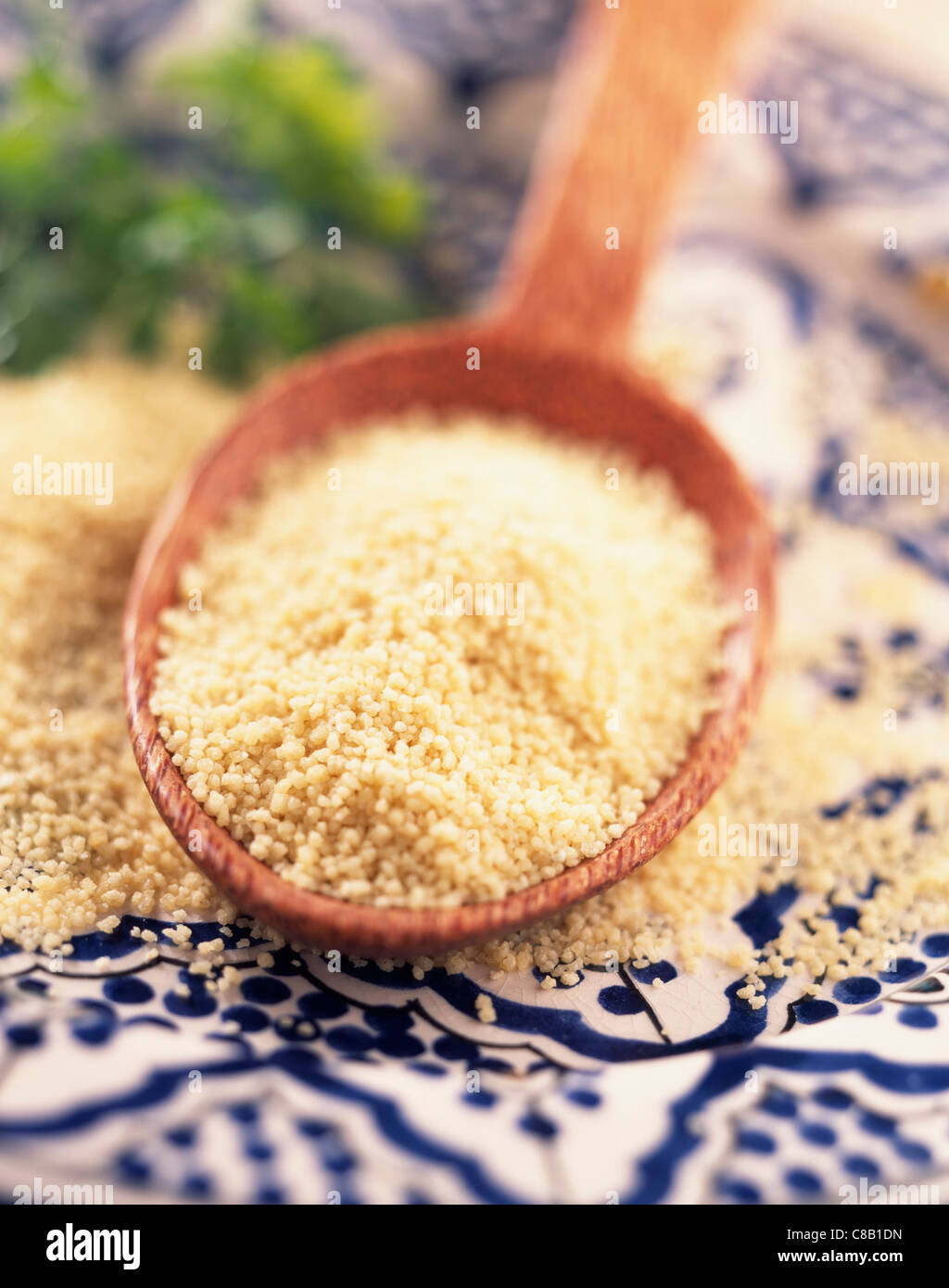 Spoonful of semolina for couscous Stock Photo - Alamy