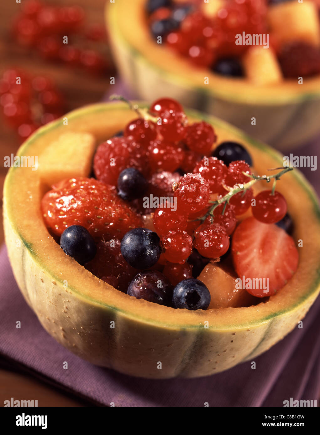 Fruit-filled melon surprise Stock Photo - Alamy