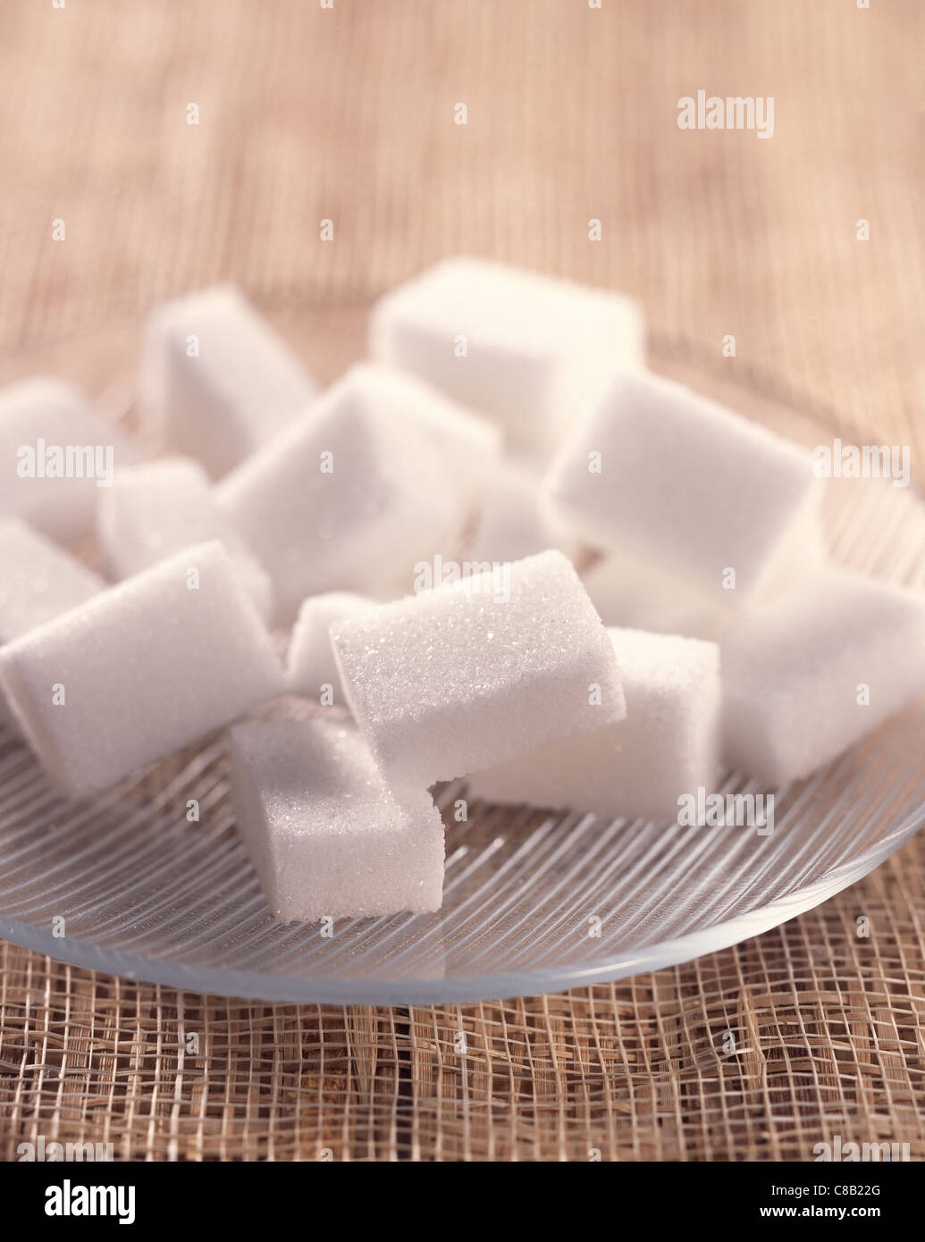 White sugar lumps Stock Photo - Alamy