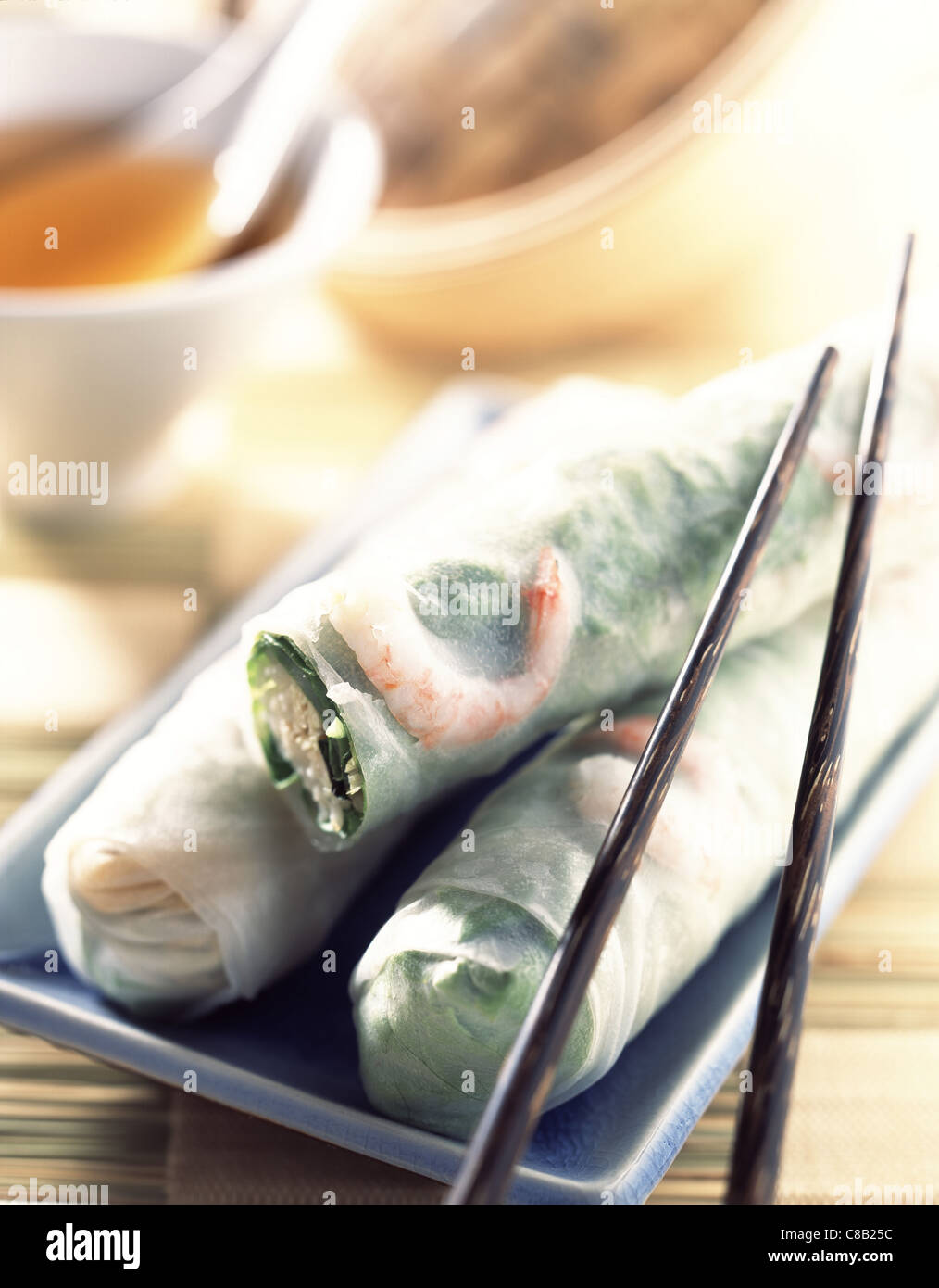 Spring rolls with chopsticks Stock Photo - Alamy