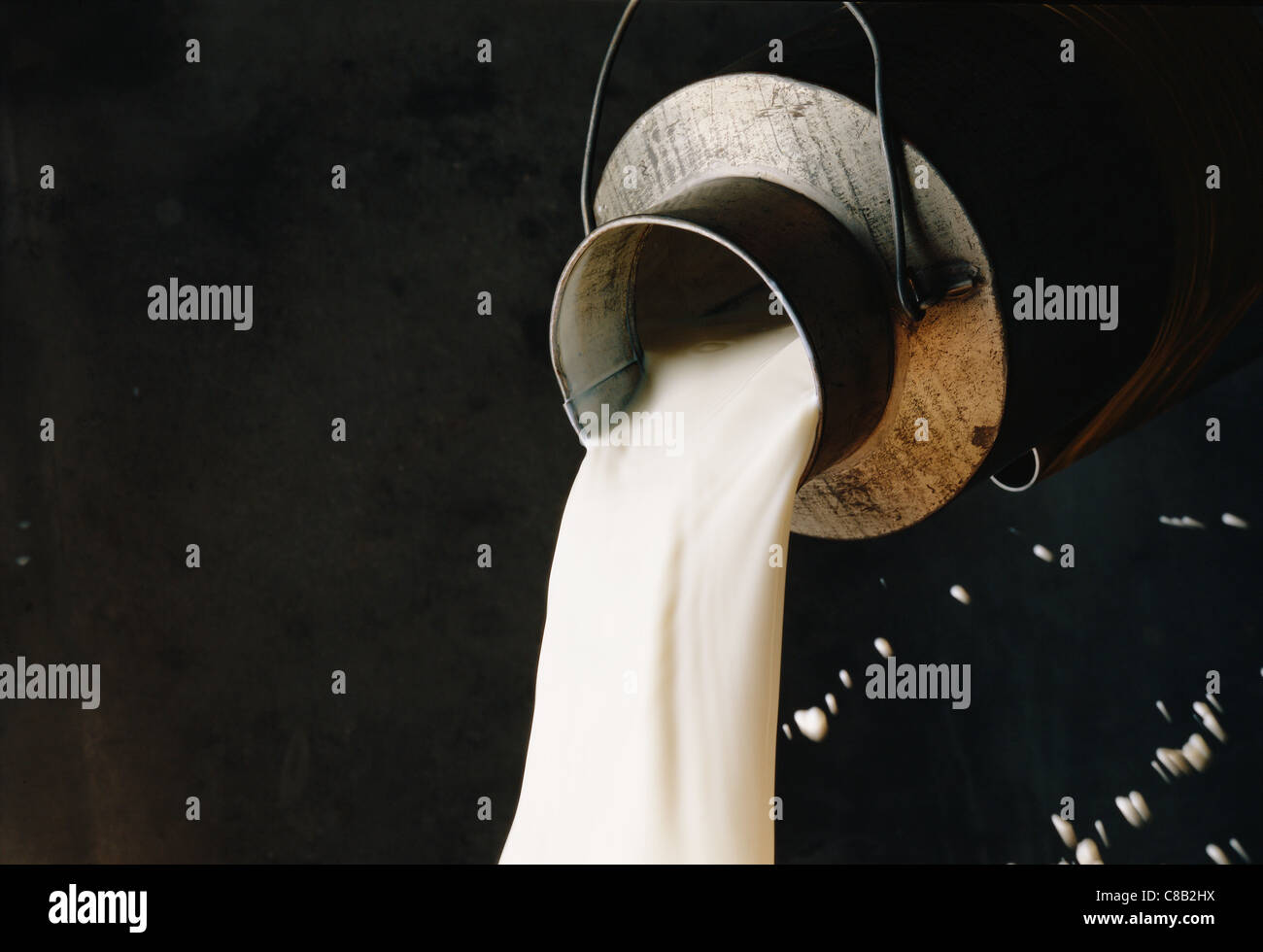 Pouring milk churn hi-res stock photography and images - Alamy