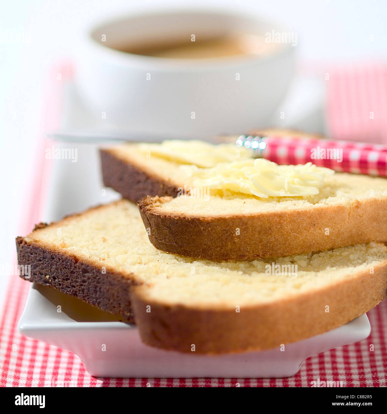 Slices of sweet bread with butter Stock Photo - Alamy