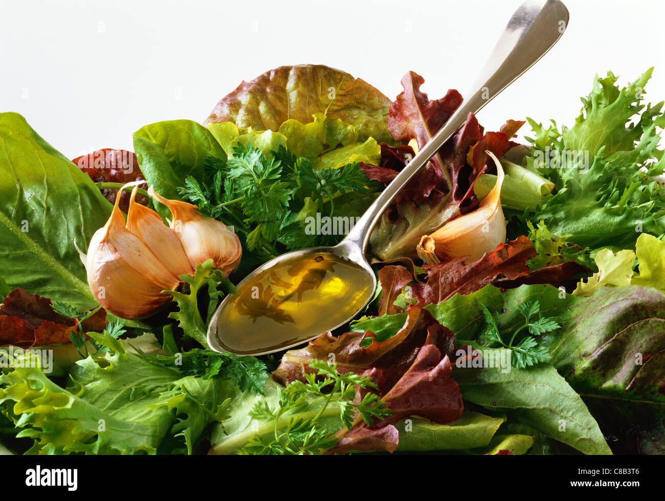 lettuce, olive oil and garlic Stock Photo - Alamy