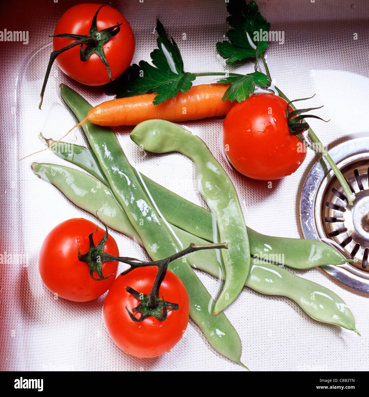 Vegetables in the sink Stock Photo - Alamy