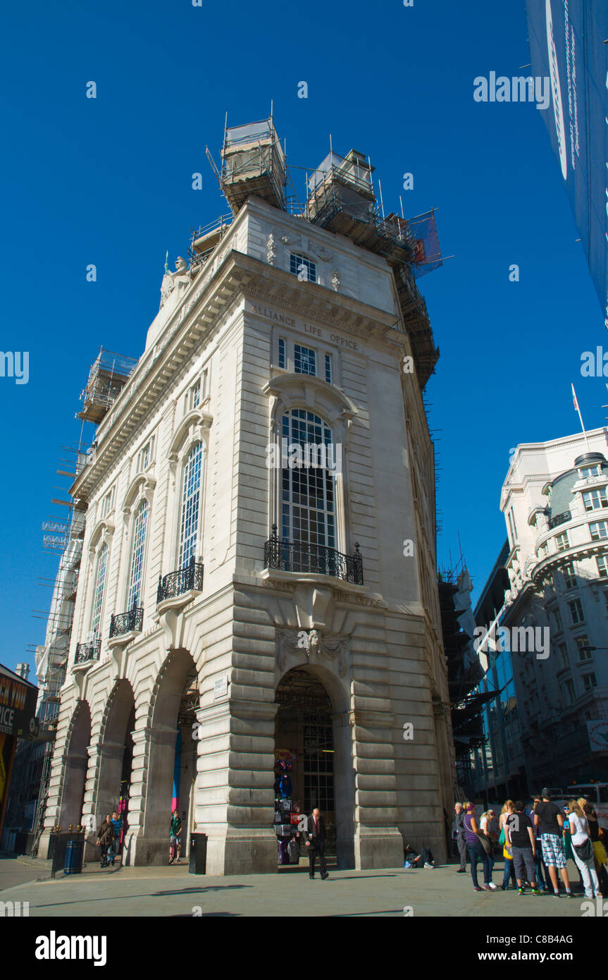 Construction on top of a building at Piccadilly Circus central London ...