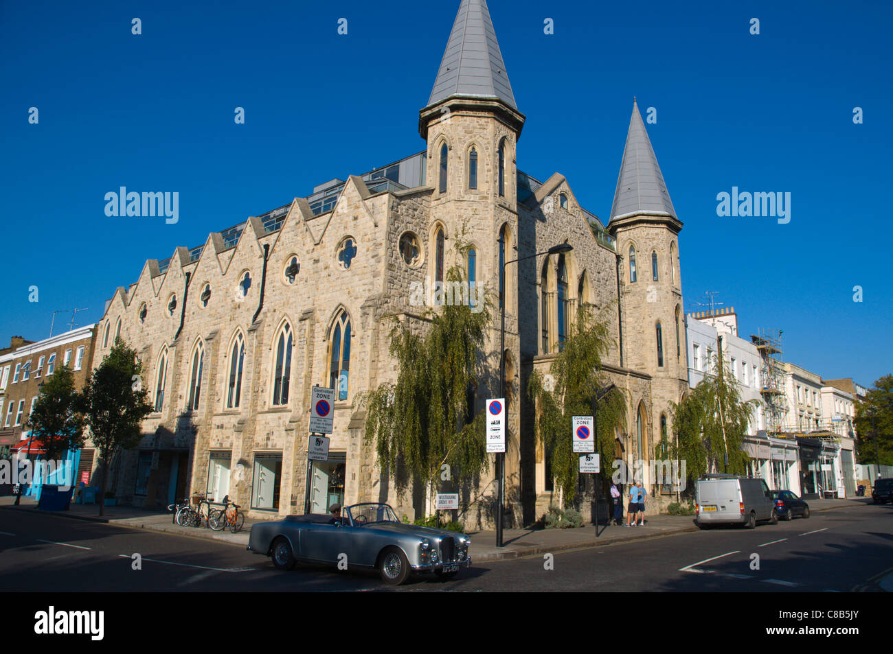 Traffic in front of Westbourne Grove church Notting Hill district ...