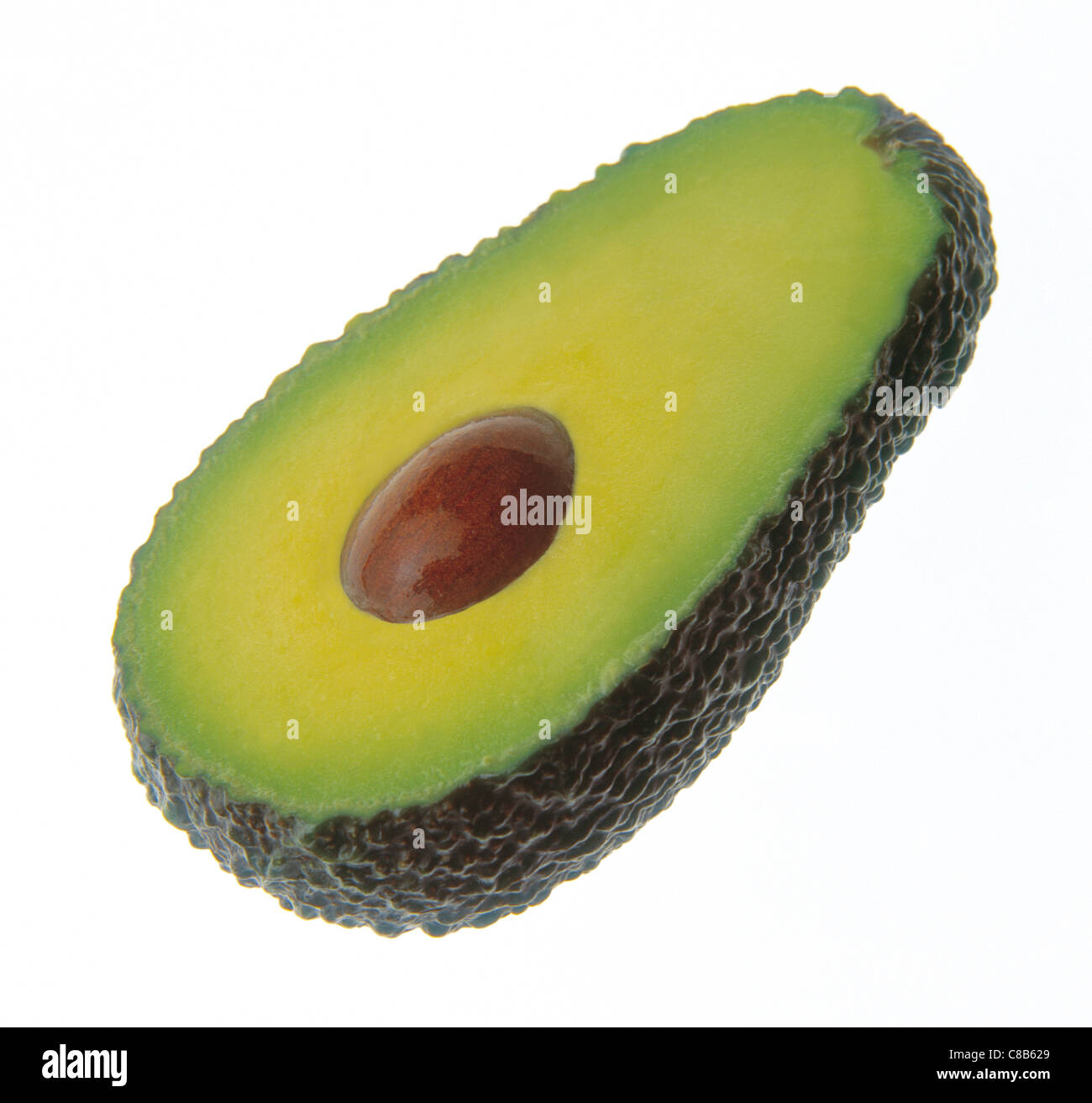 Halved avocado hi-res stock photography and images - Alamy