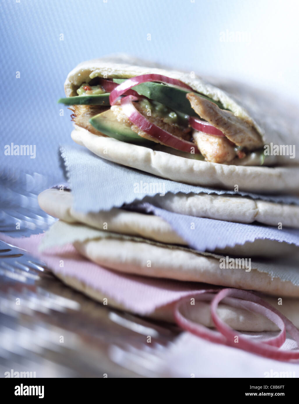 Pitta bread stuffed with chicken and avocado Stock Photo - Alamy