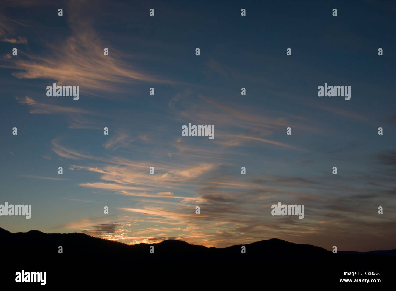 Sunset and clouds over Mount Samson, Queensland, Australia Stock Photo ...