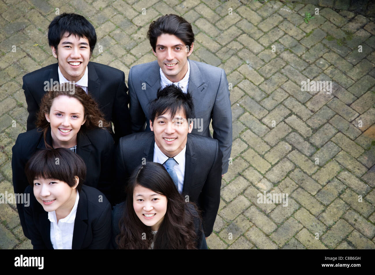Happy multi ethnic business group Stock Photo - Alamy