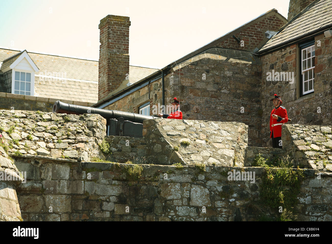 Castle Cornet Noon day Canon firing St Peter Port Guernsey Stock Photo ...