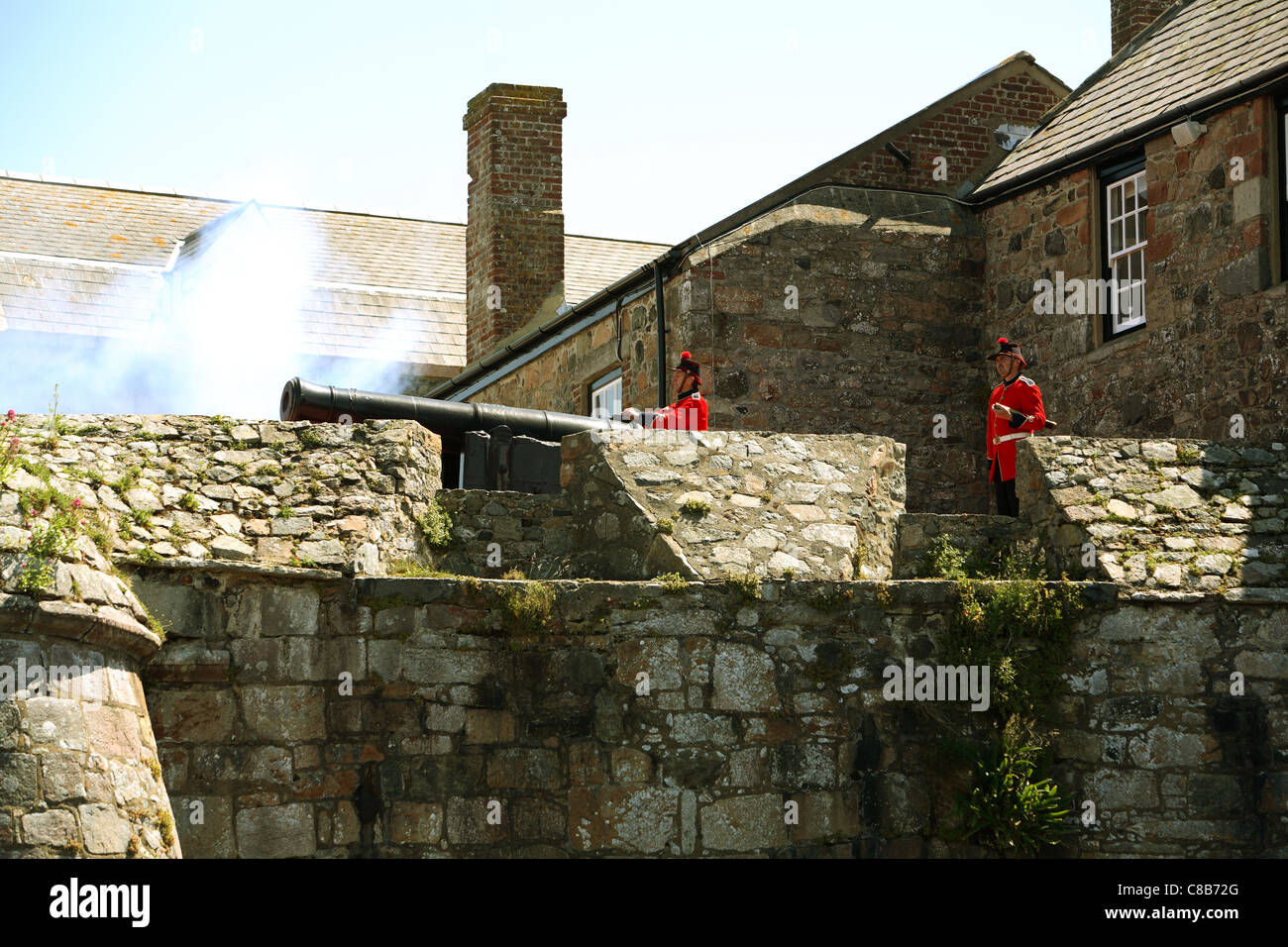 Castle Cornet Noon day Canon firing St Peter Port Guernsey Stock Photo ...