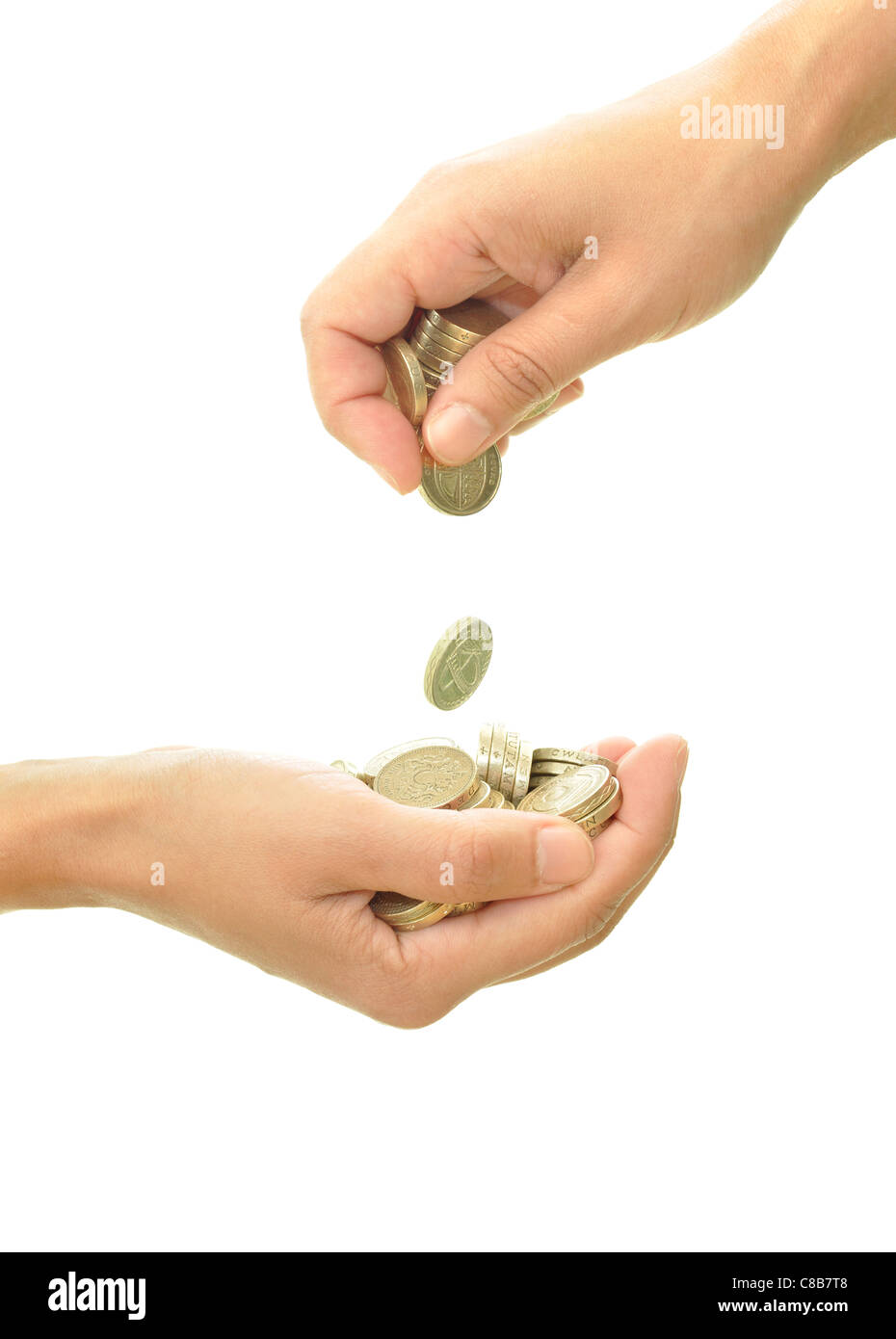 Hand outstretched receiving several coins Stock Photo - Alamy