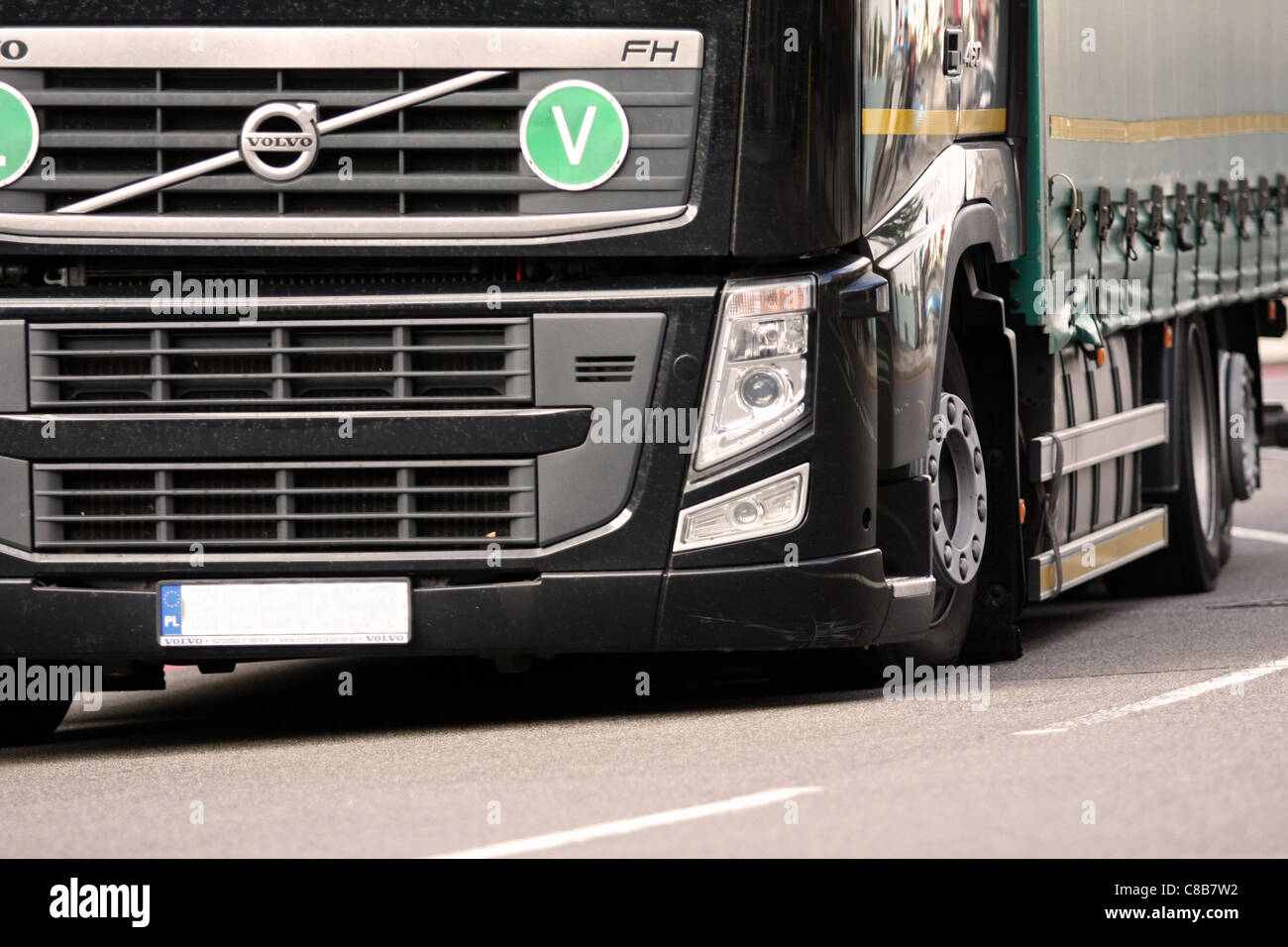 a low level view of part of a truck as it travels along a road Stock ...