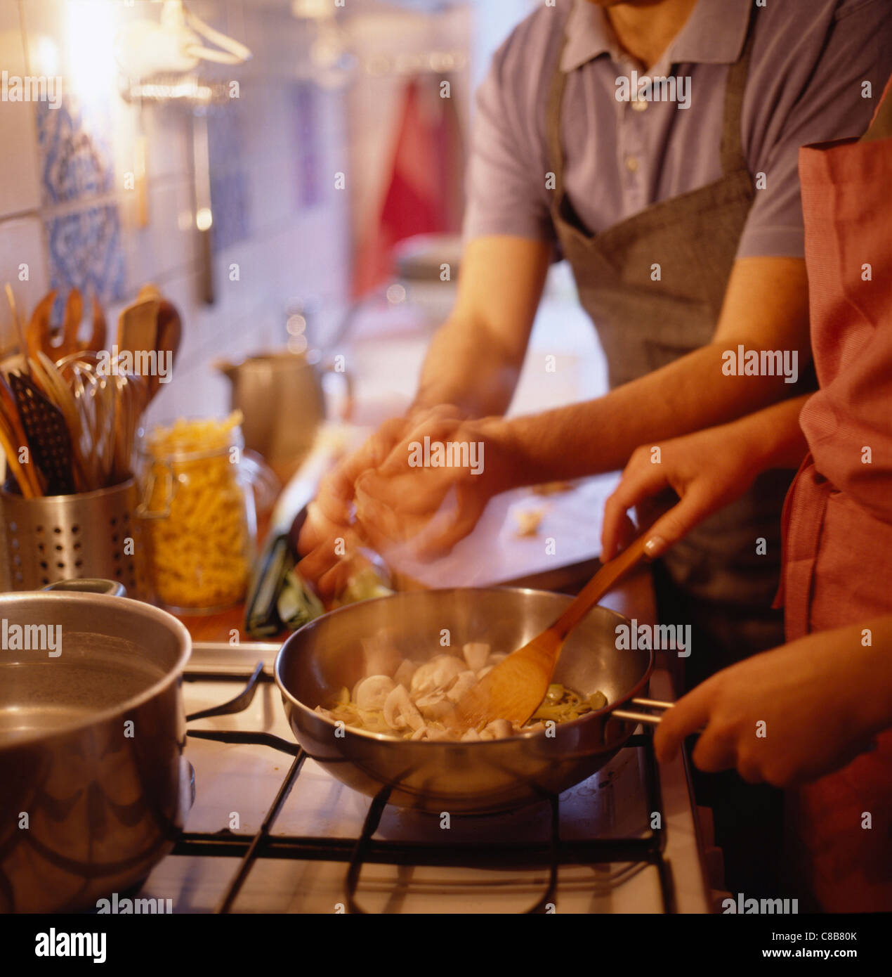 Browning vegetables in pan Stock Photo - Alamy