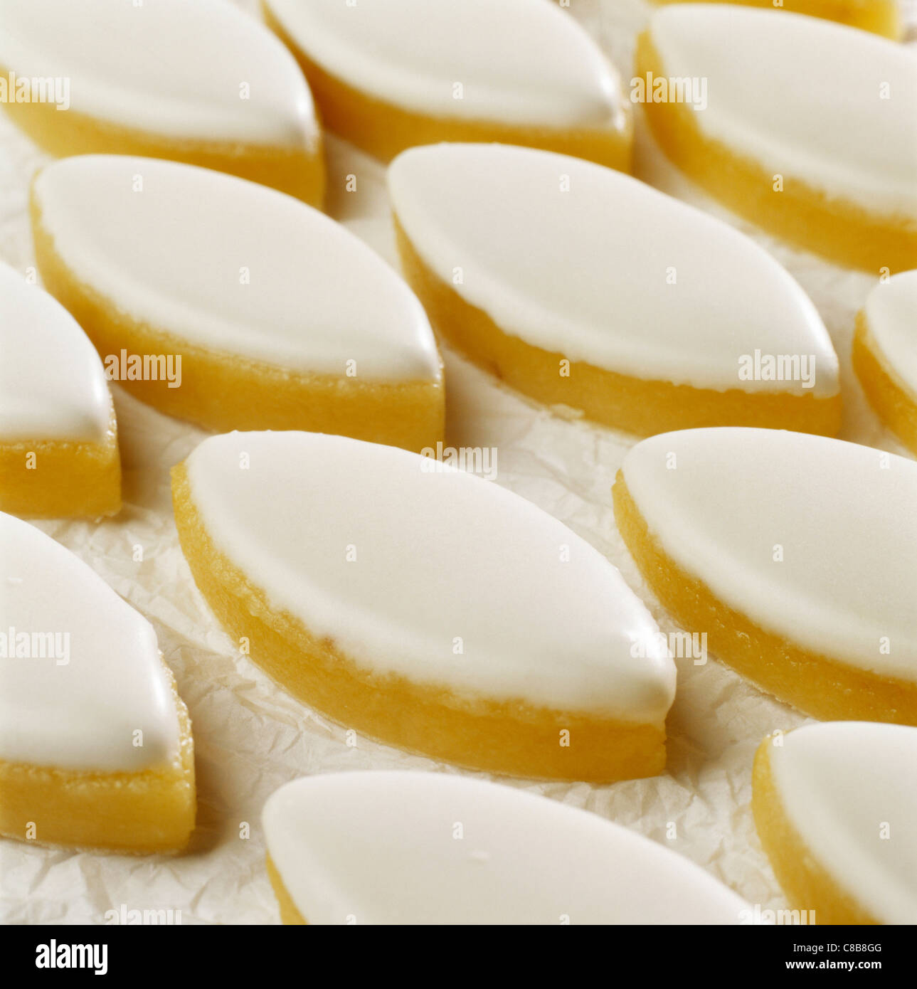 Diamond-shaped almond paste and icing Calisson sweets Stock Photo - Alamy