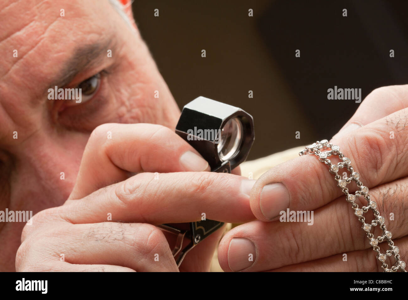 Inspecting jewelry hi-res stock photography and images - Alamy