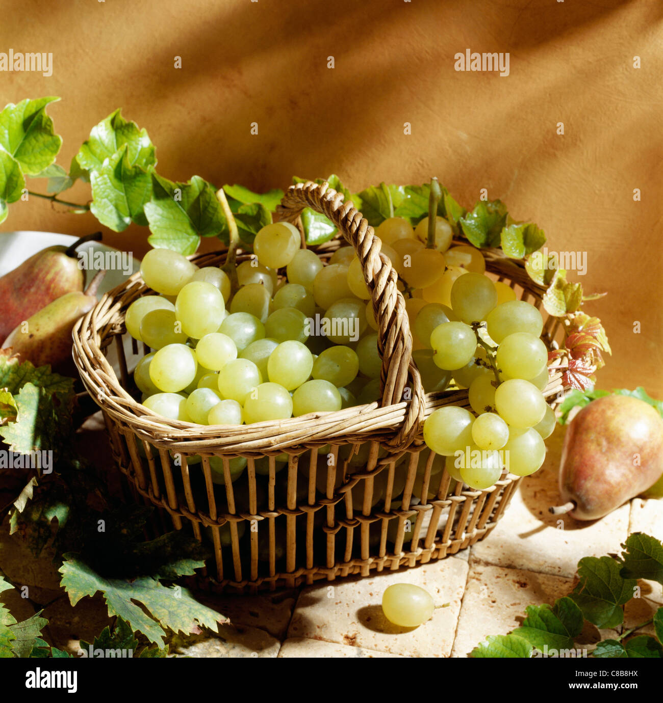 Basket of grapes and pears Stock Photo - Alamy