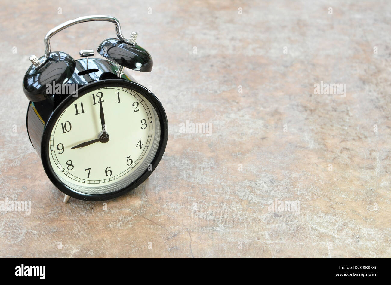 Closeup of an alarm clock face at 9 o'clock Stock Photo - Alamy