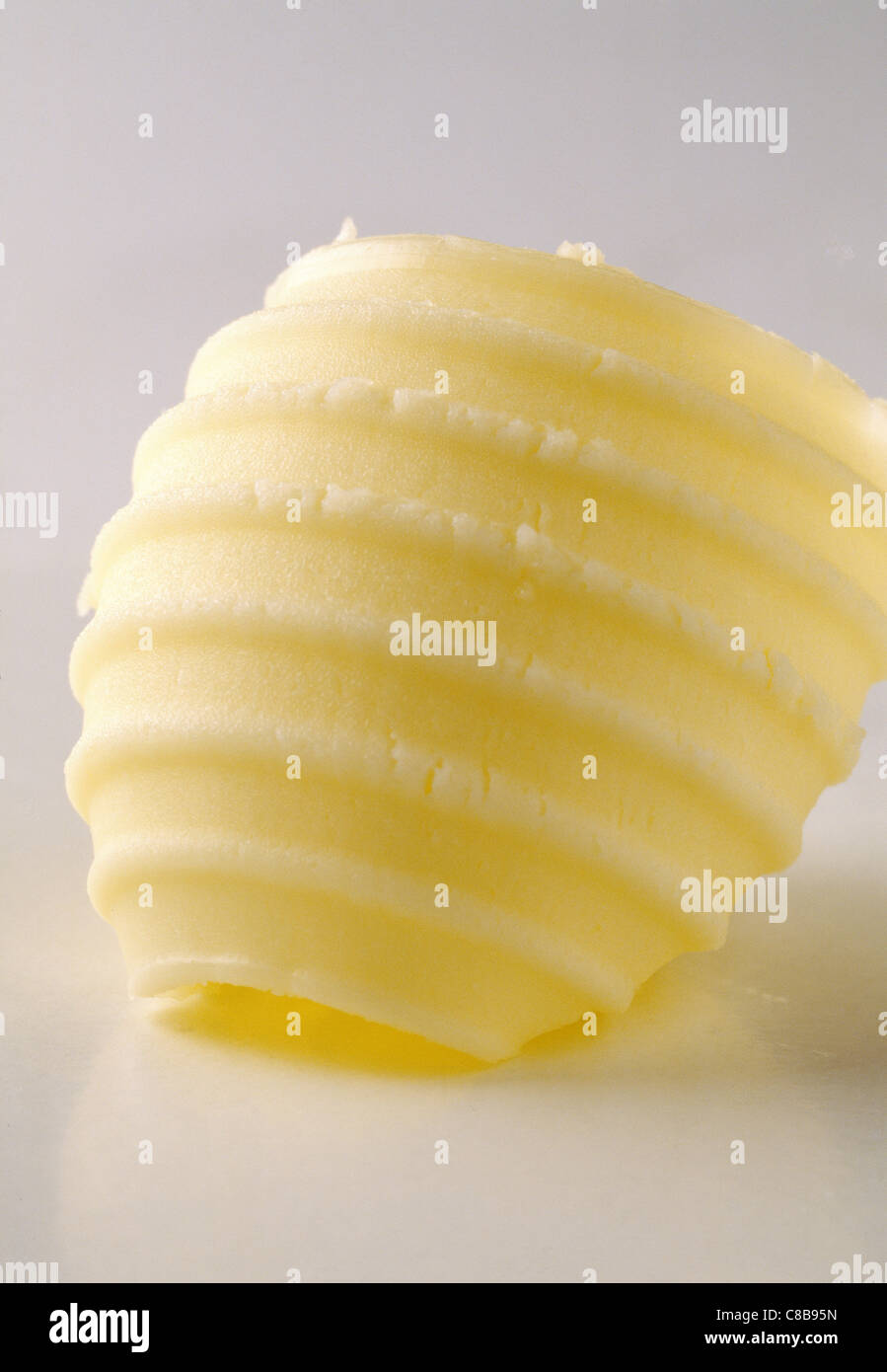 Curl of butter Stock Photo - Alamy