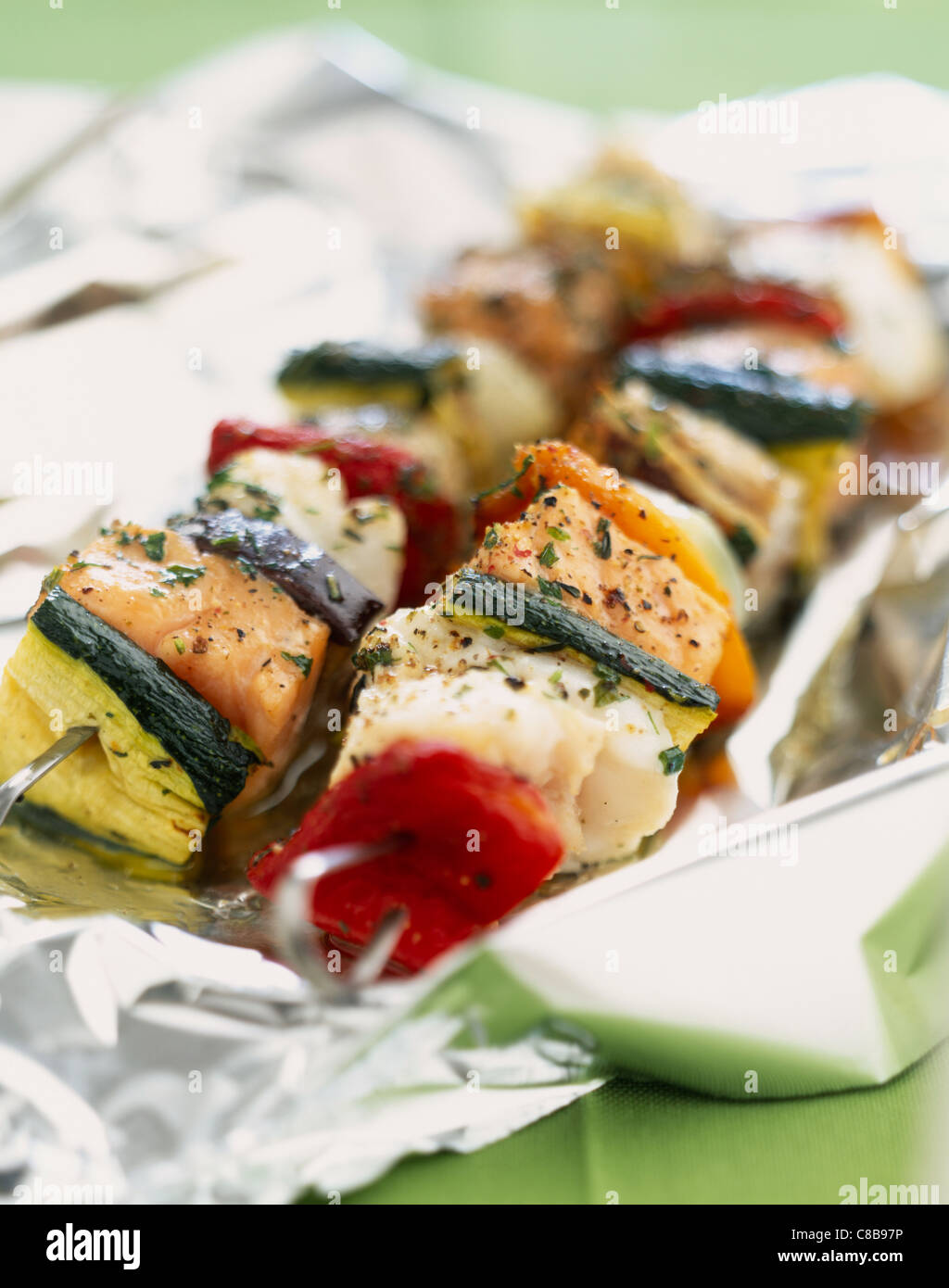 Fish and vegetable brochettes Stock Photo - Alamy