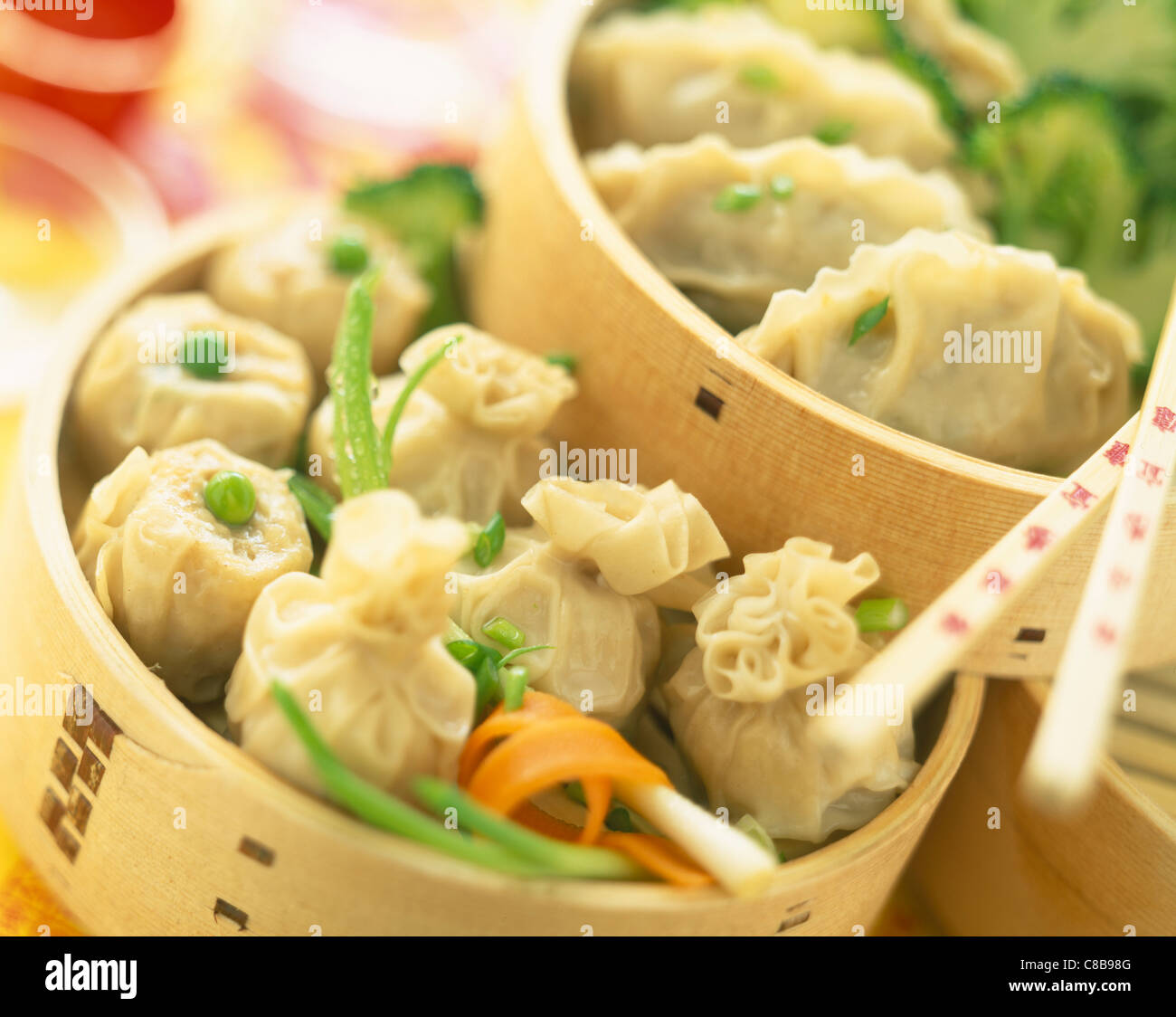Selection of steamed bite-sized food Stock Photo - Alamy