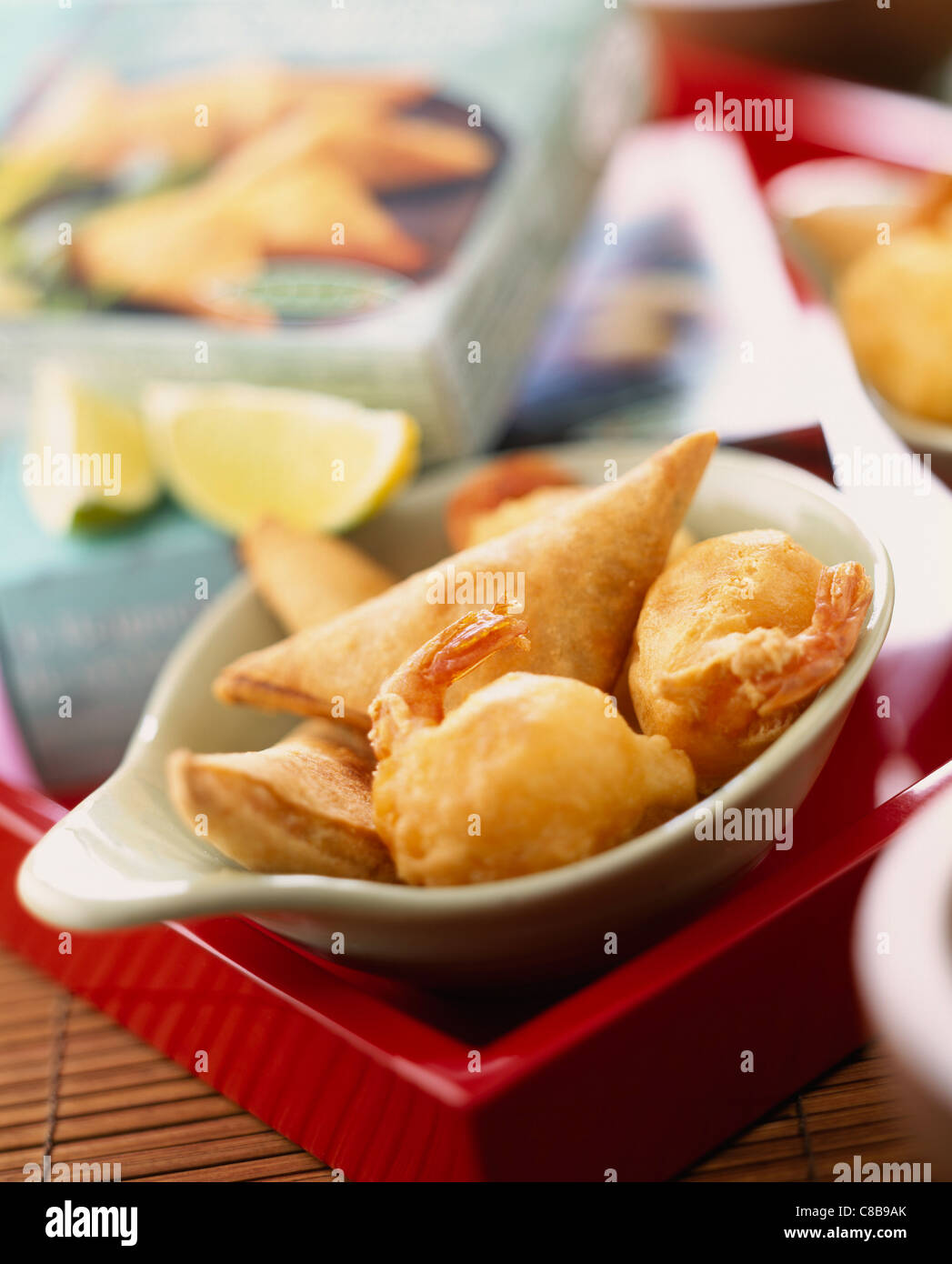 Samosas and prawn fritters Stock Photo - Alamy