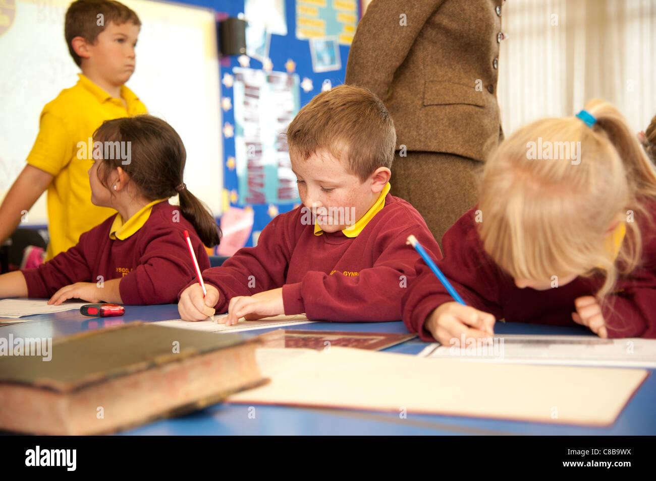 Primary school children working in a classroom, Wales UK Stock Photo ...
