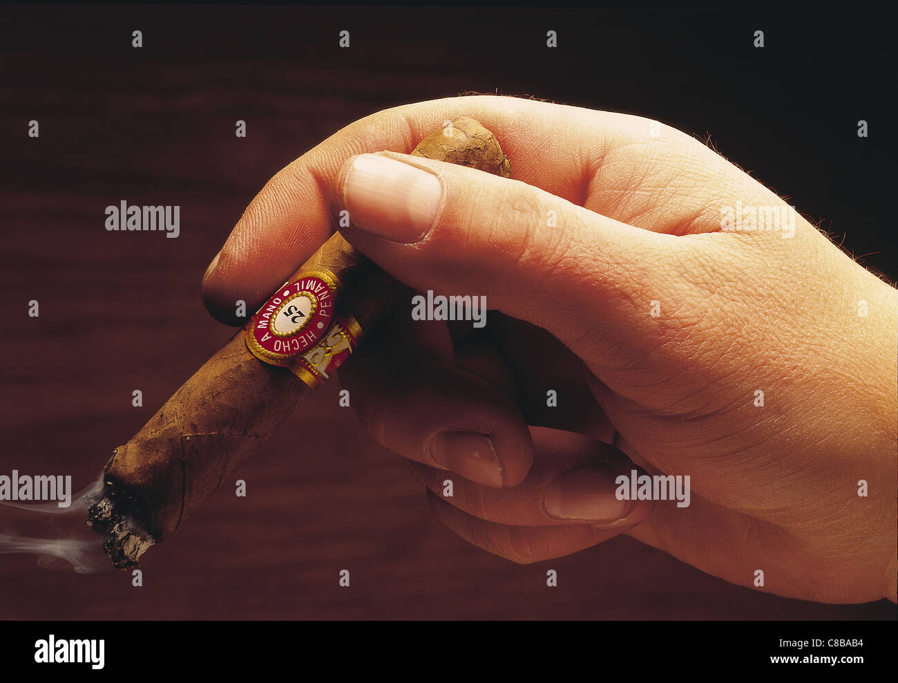 Hand Holding Cigar High Resolution Stock Photography and Images - Alamy